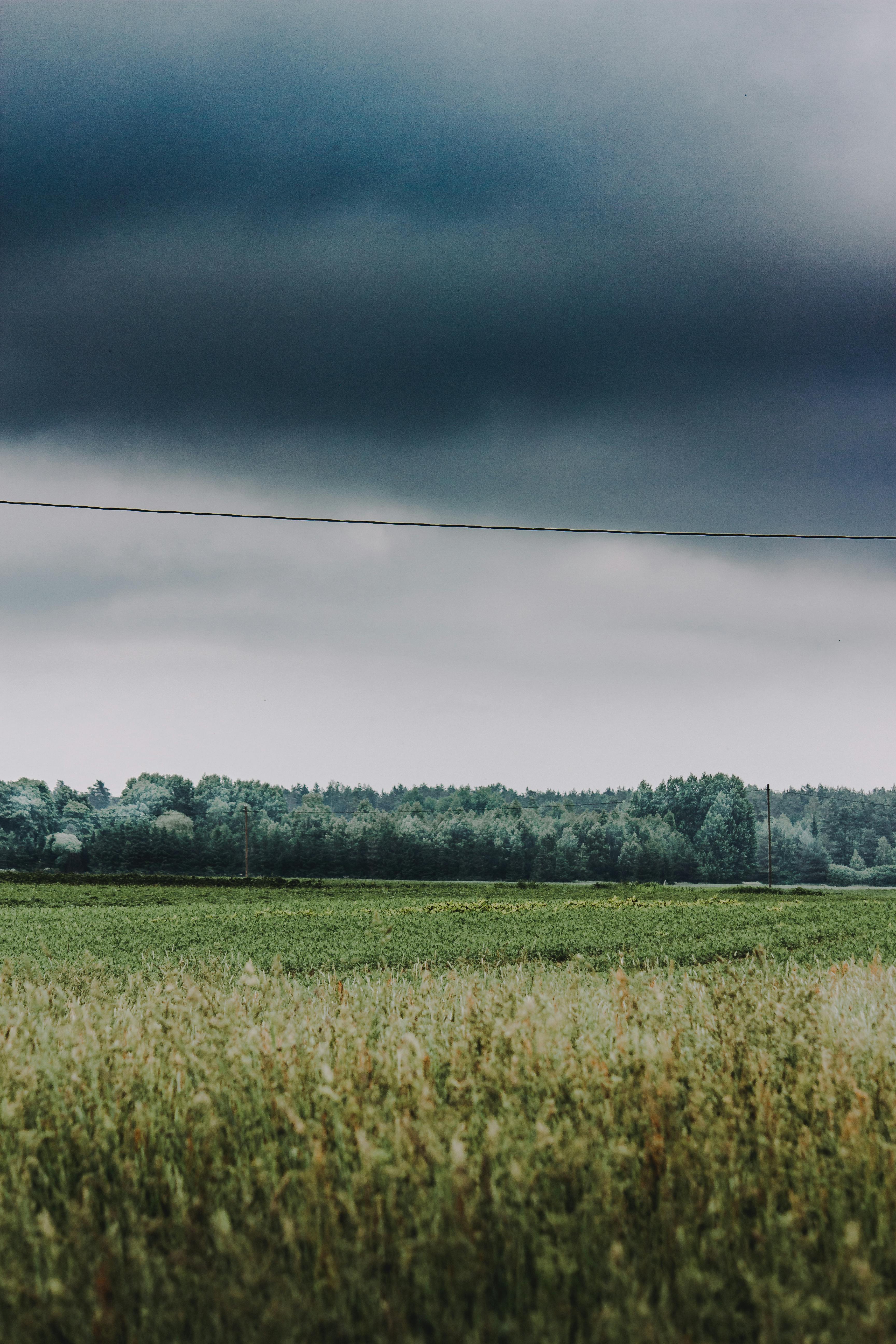 Storm Cloud over Field in Countryside · Free Stock Photo