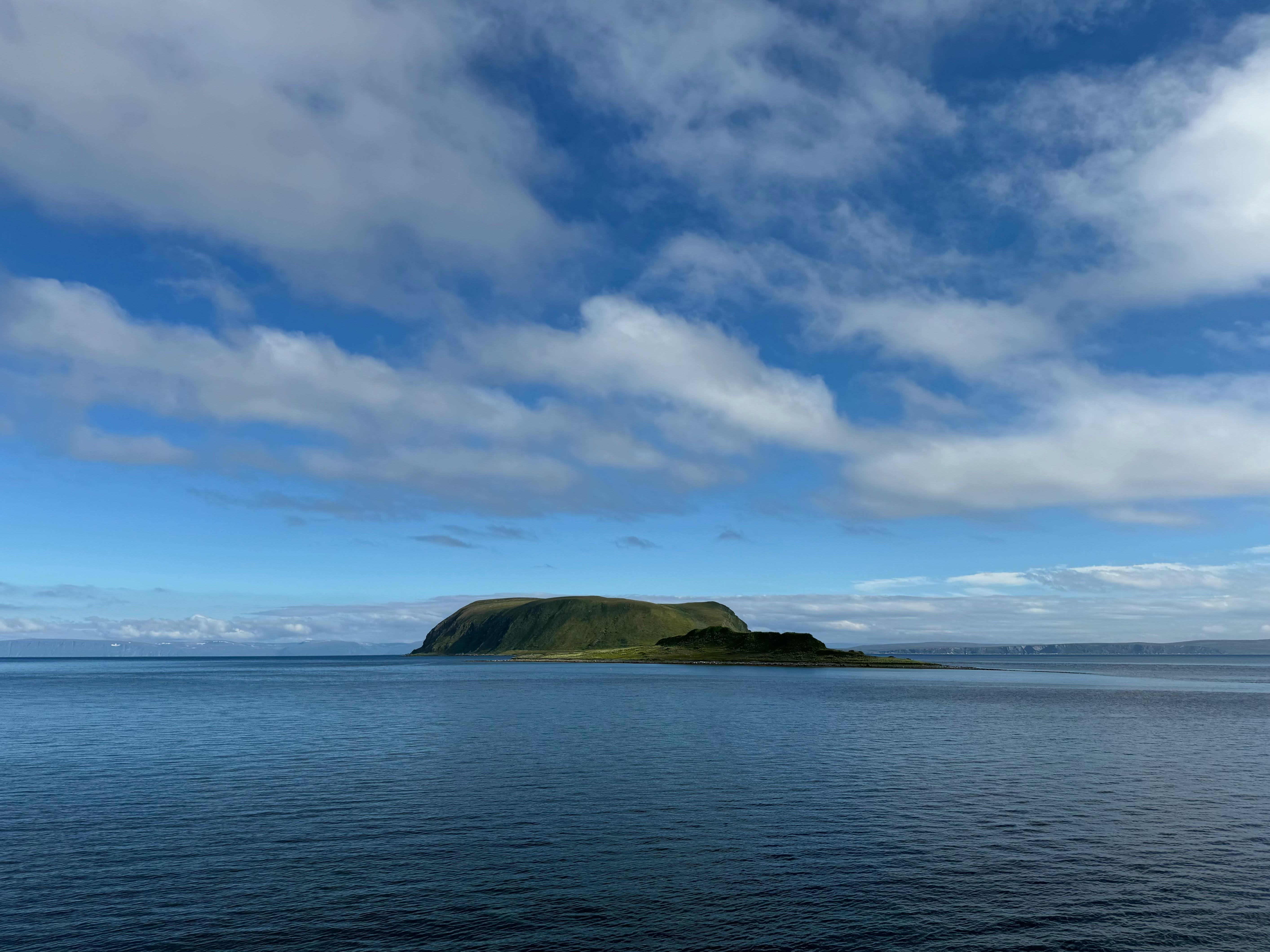 Clouds over Island on Sea Coast · Free Stock Photo