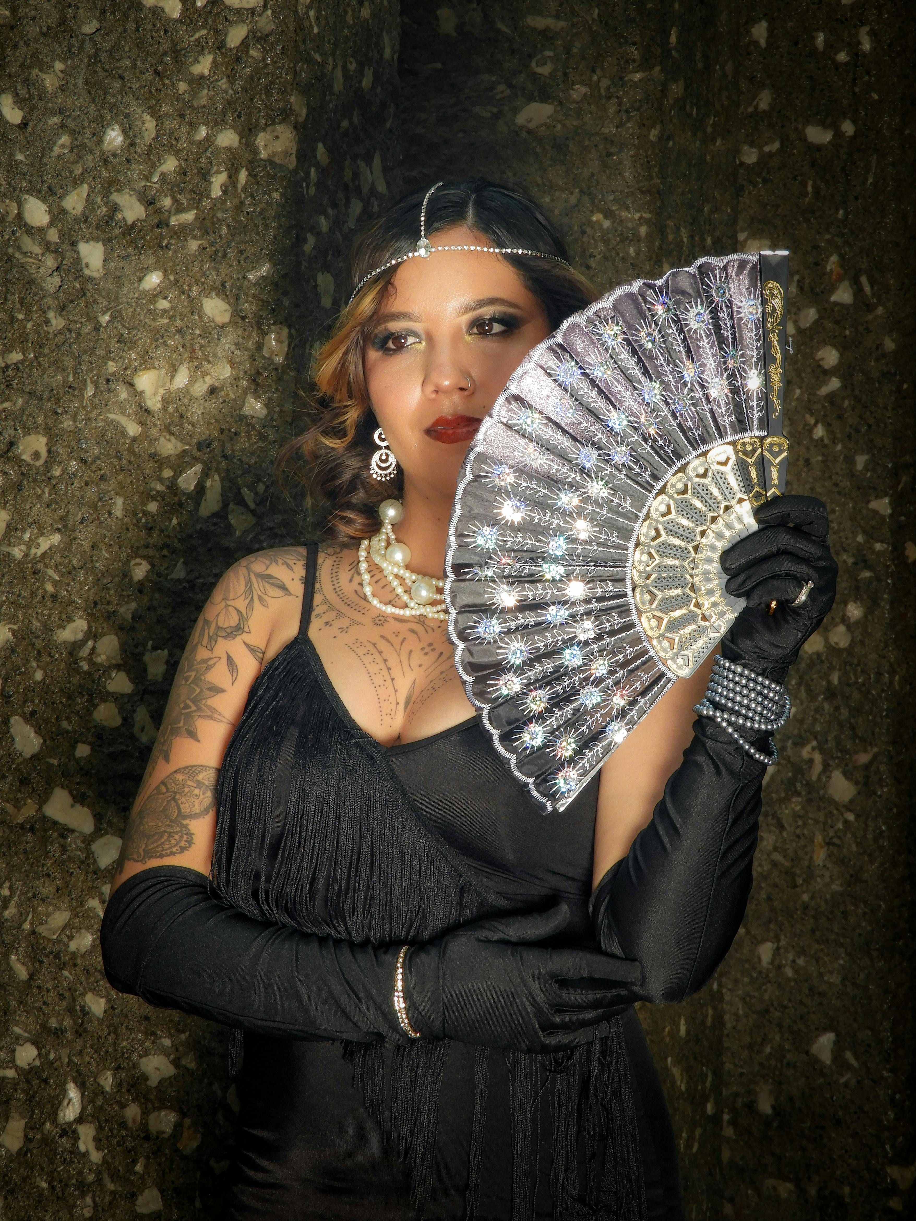 Woman in Retro Flapper Dress with Fan · Free Stock Photo