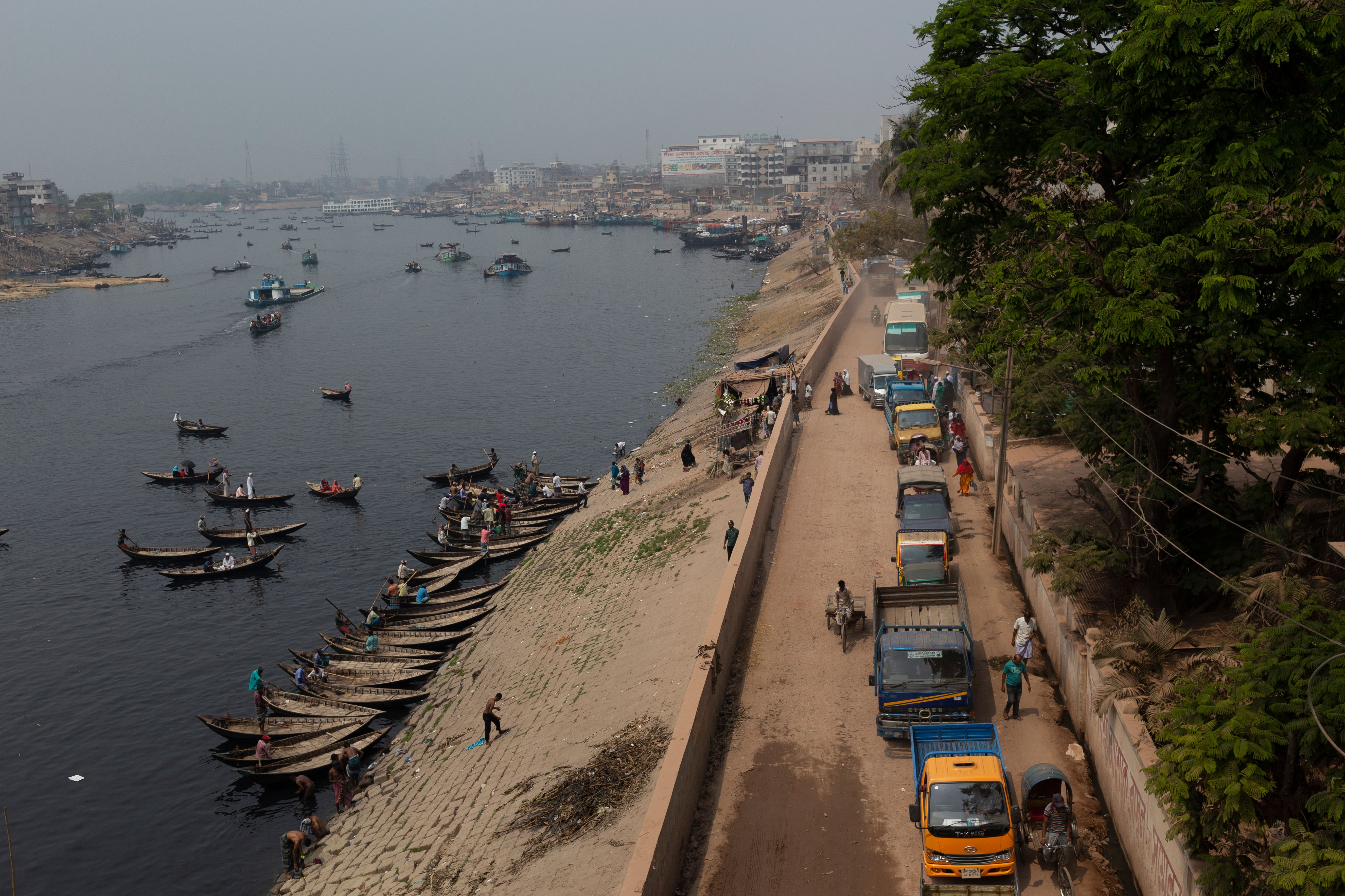 Aerial View of Cars on the Road by the River with Many Boats · Free ...