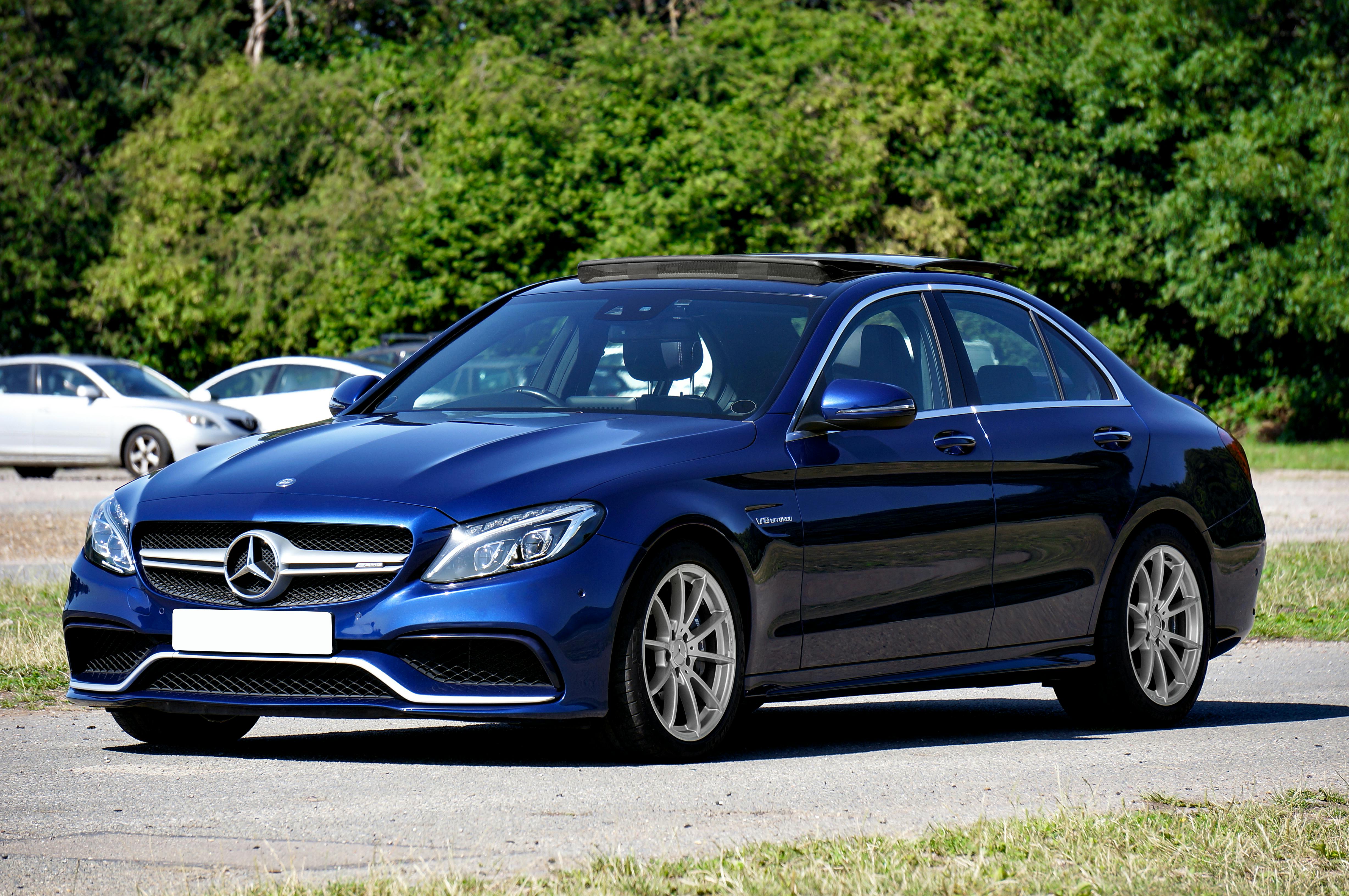 Blue Mercedes Car Parked Outdoors · Free Stock Photo
