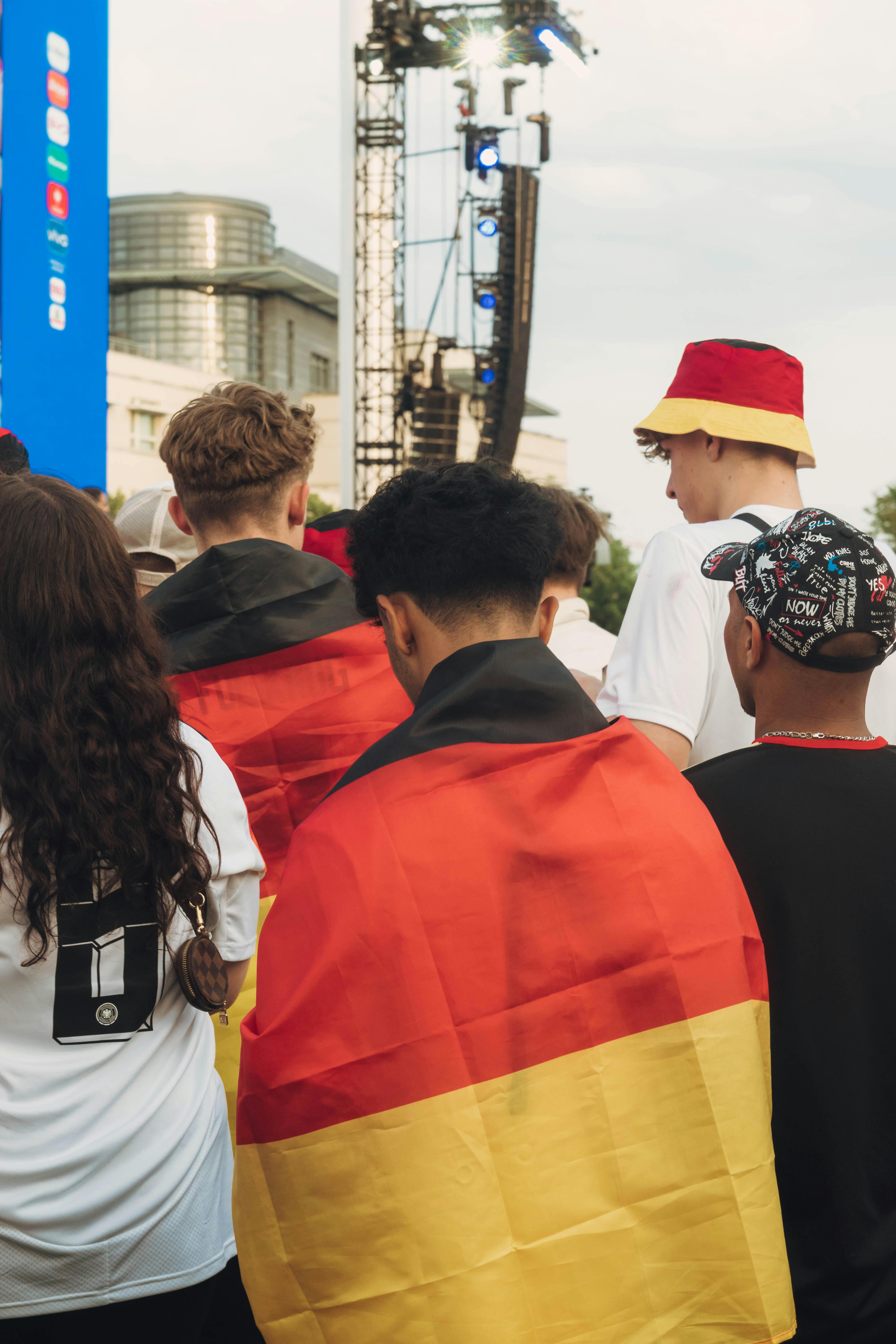 Back View of German Soccer Fans · Free Stock Photo