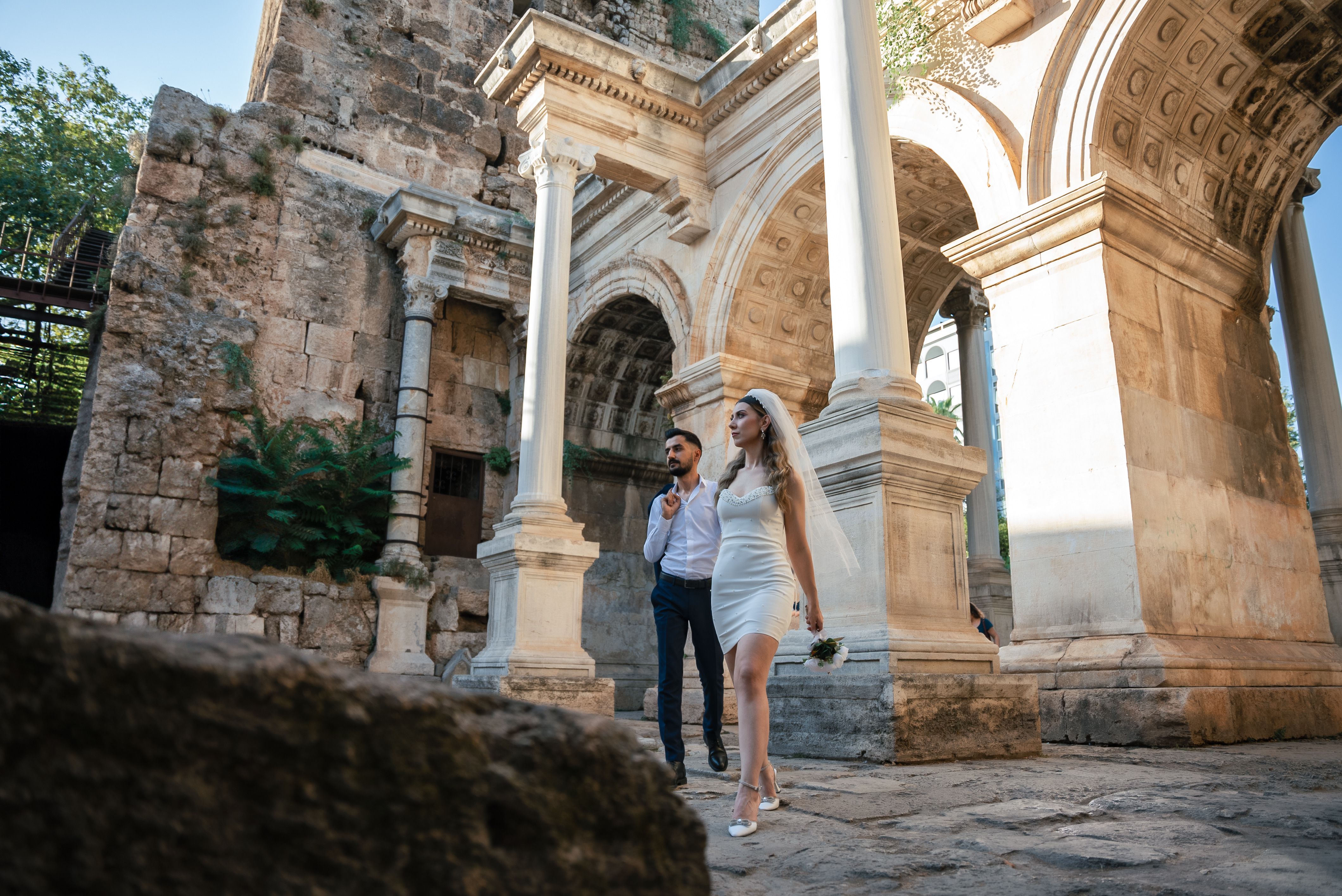 The Bride and Groom Posing on the Background of Ancient Ruins · Free ...