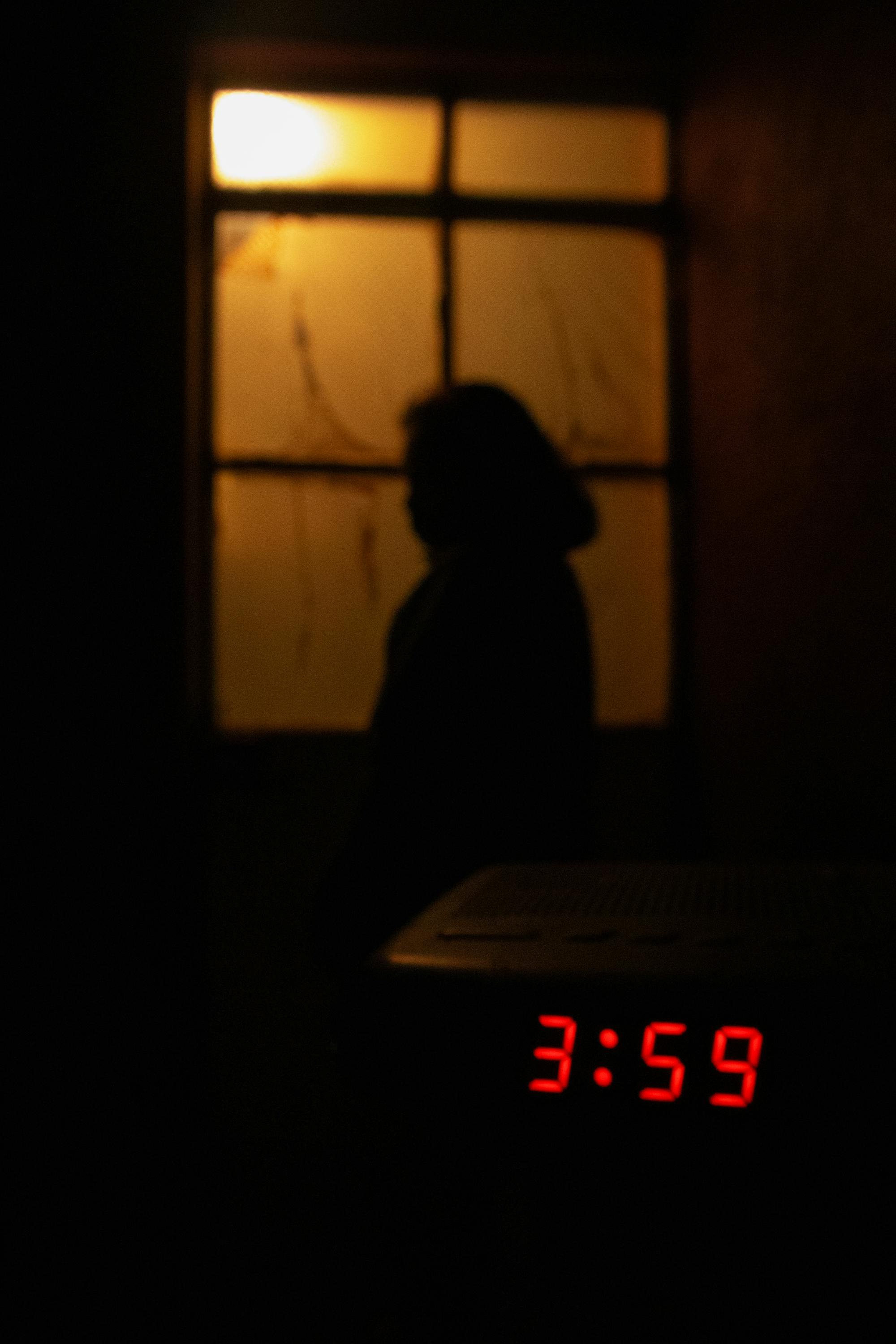 Silhouette of Woman at Night · Free Stock Photo