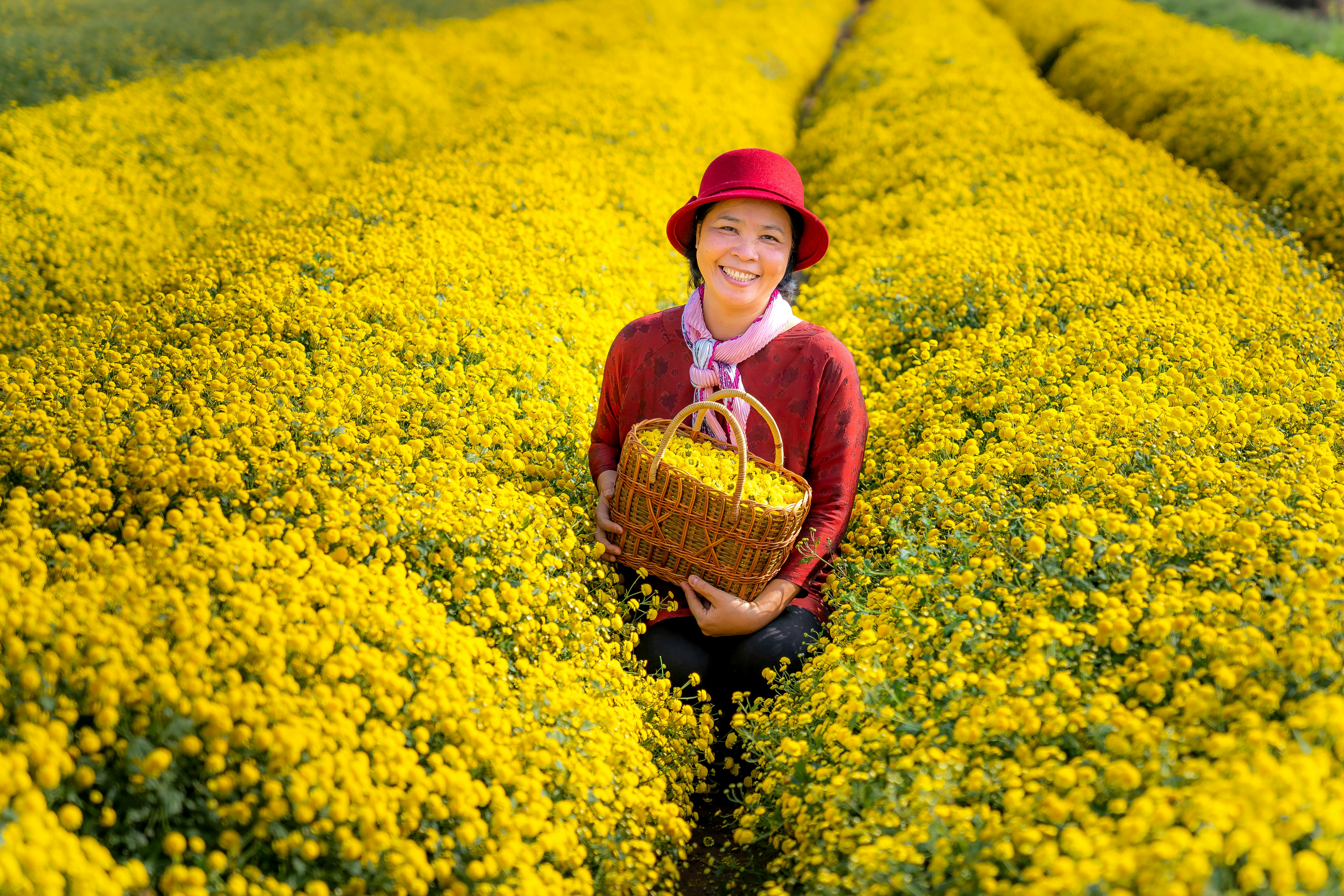 Photo Of Woman Standing On A Flower Field · Free Stock Photo