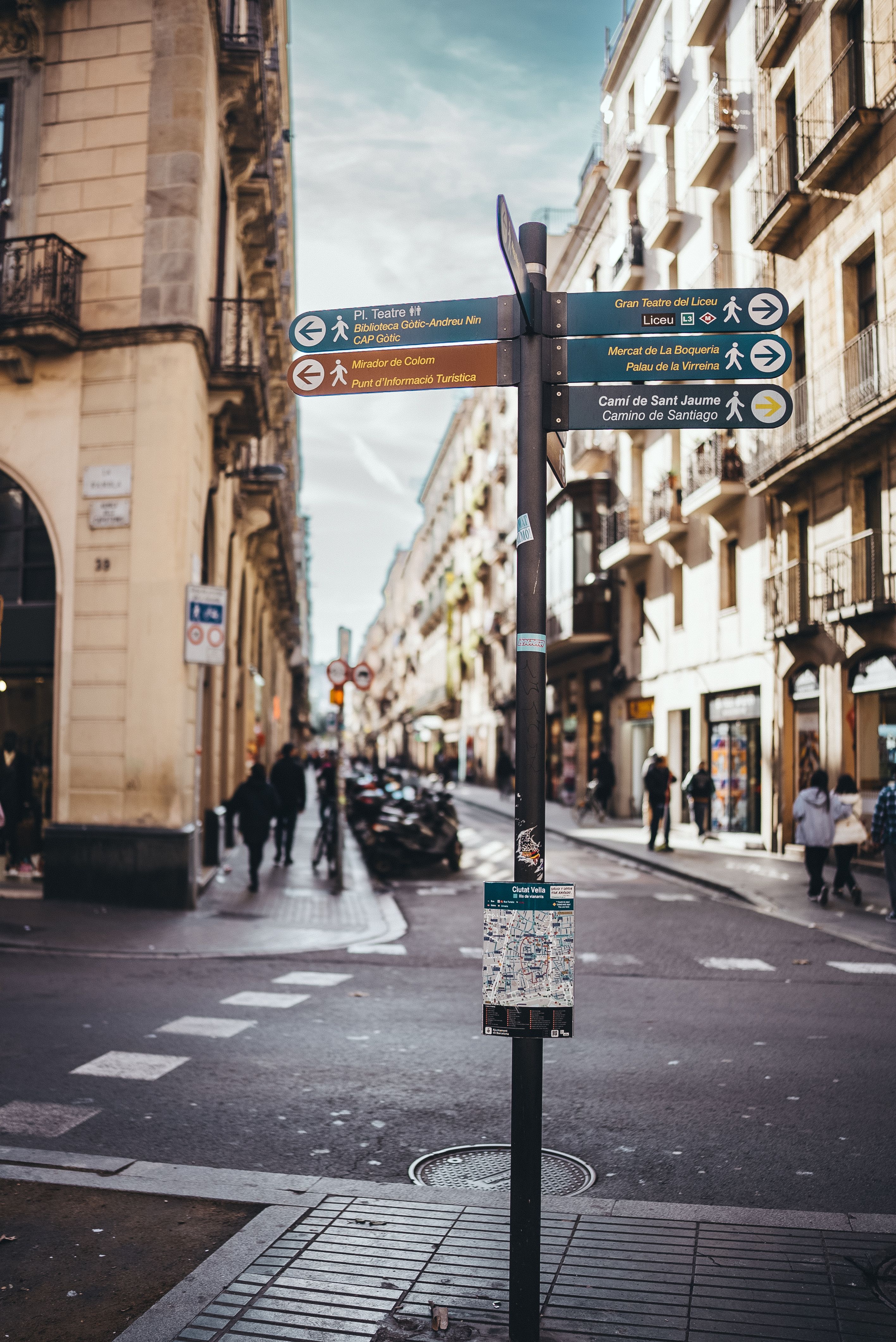 City Street with Directional Signs · Free Stock Photo