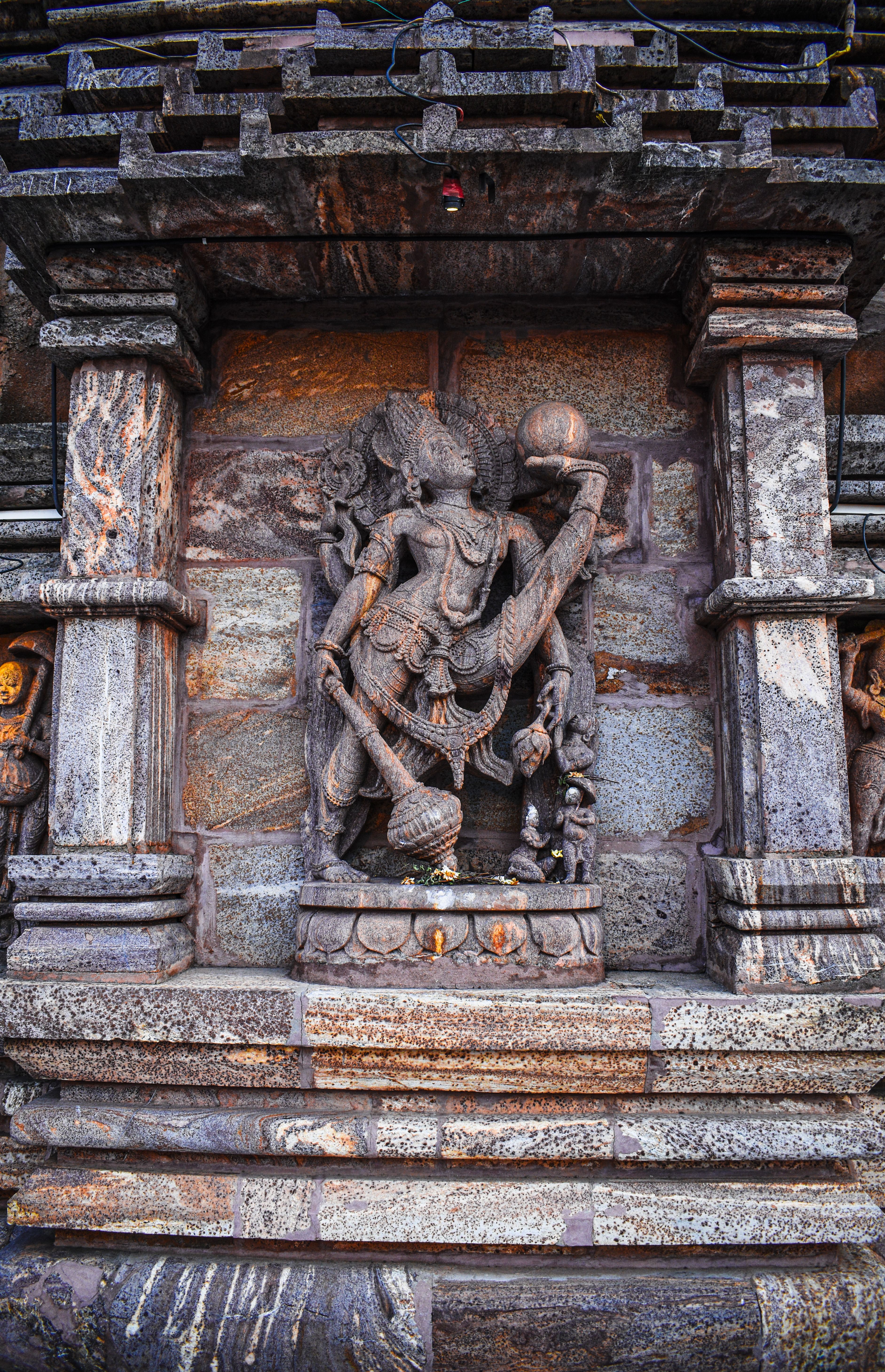 Close-up of a Carved Statue on a Temple Exterior · Free Stock Photo