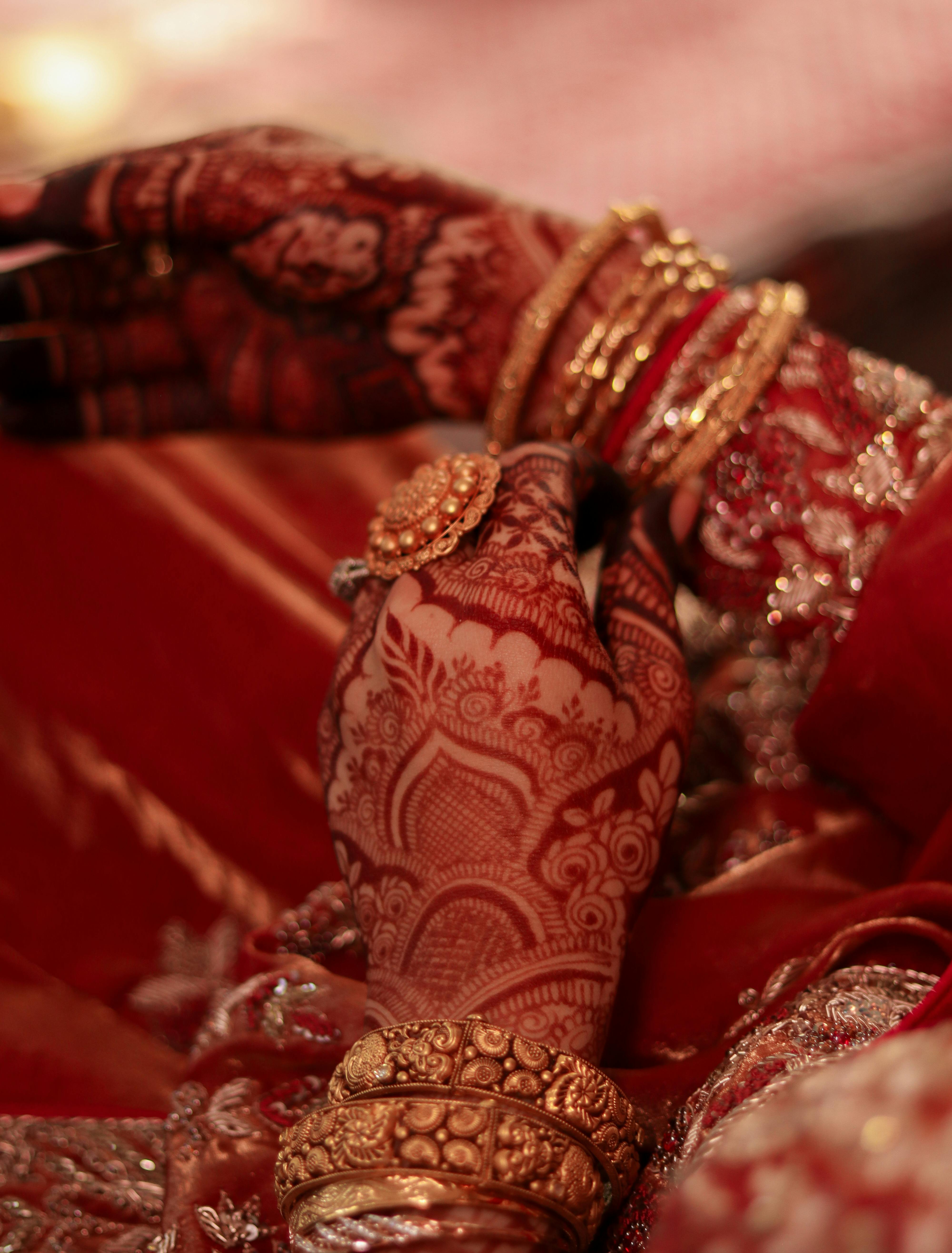 A close up of a woman's hands with henna · Free Stock Photo