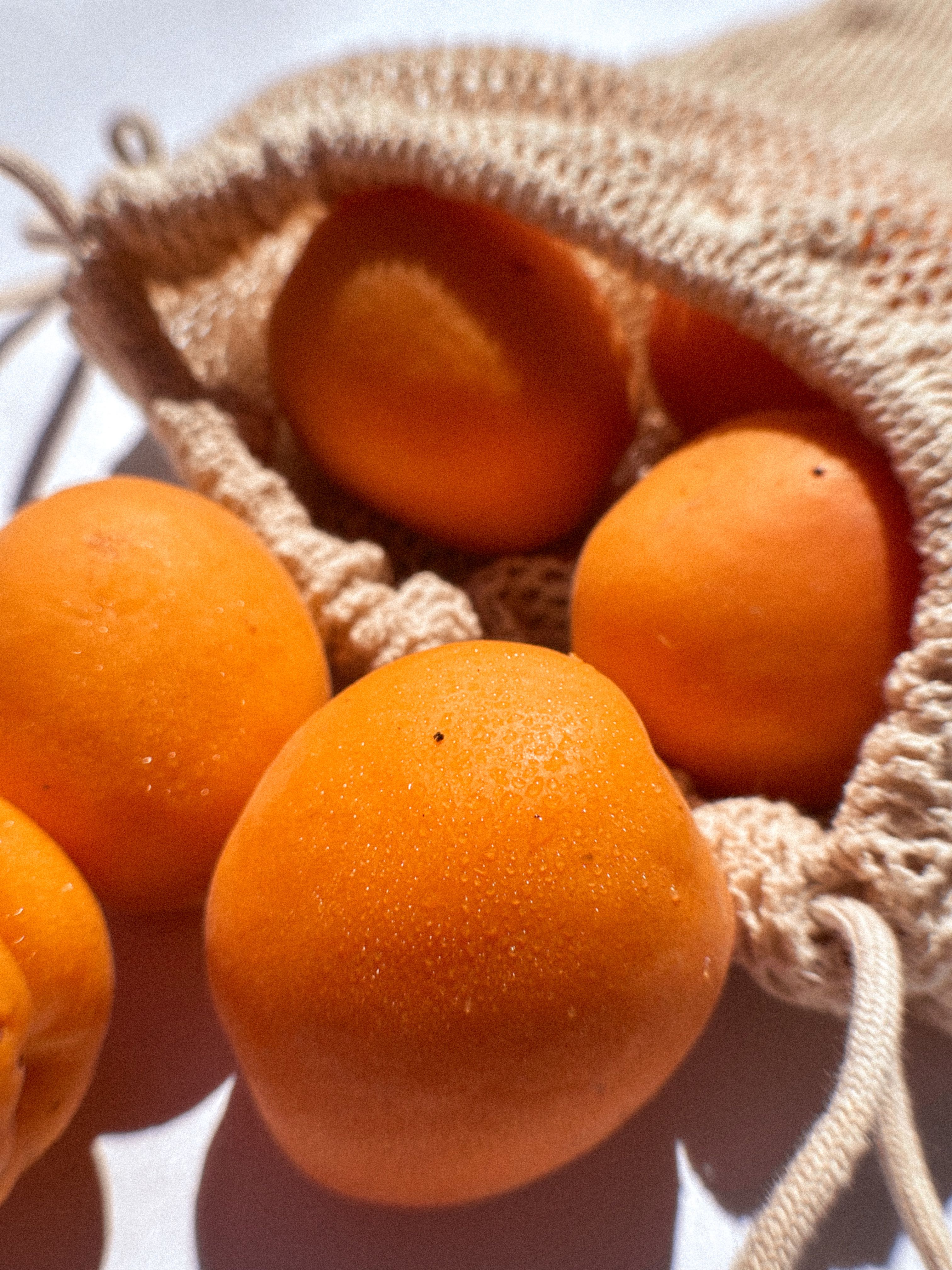 Close-up of a Bag of Apricots · Free Stock Photo