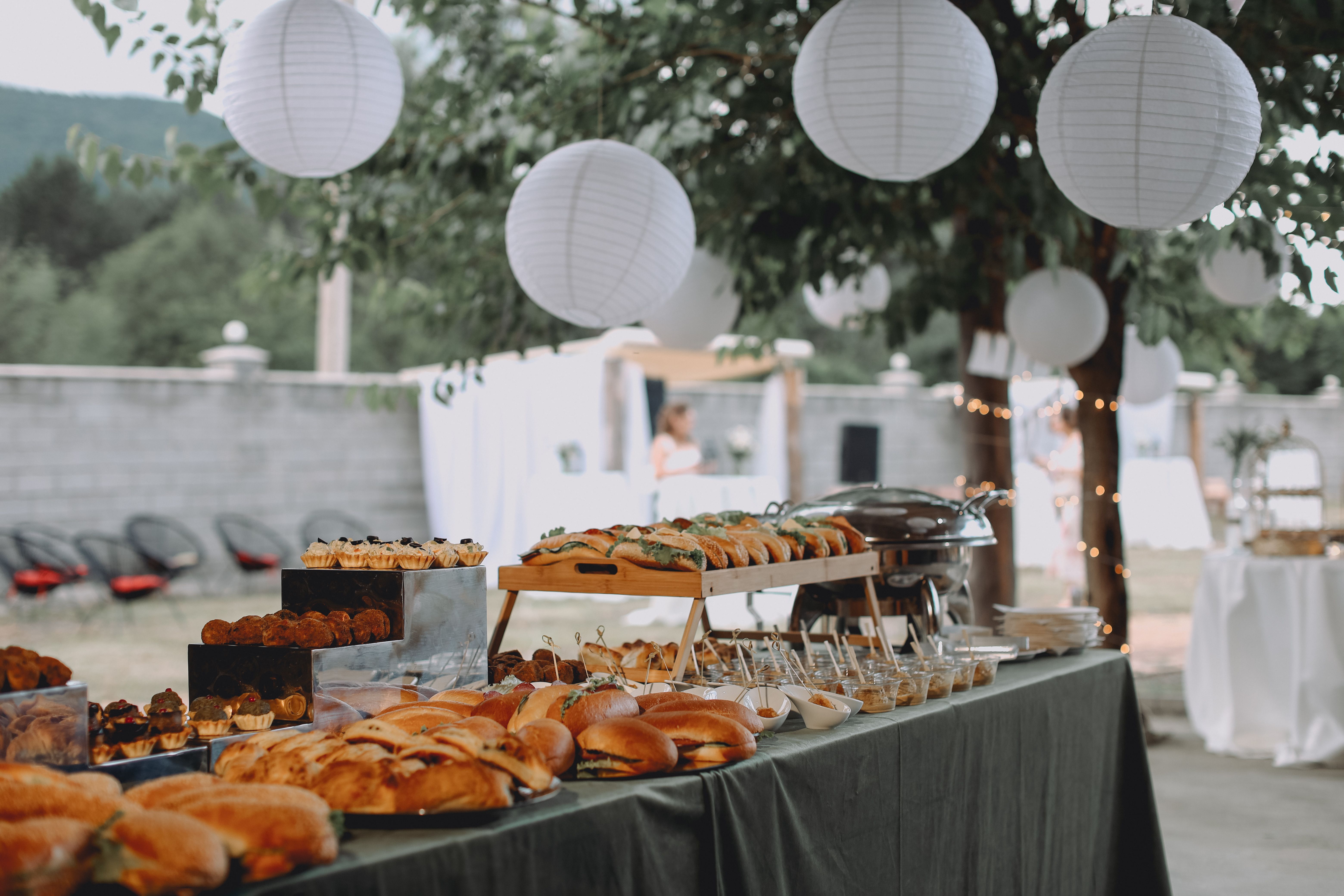 Sandwiches and Sweet Pastry on Venue Table · Free Stock Photo