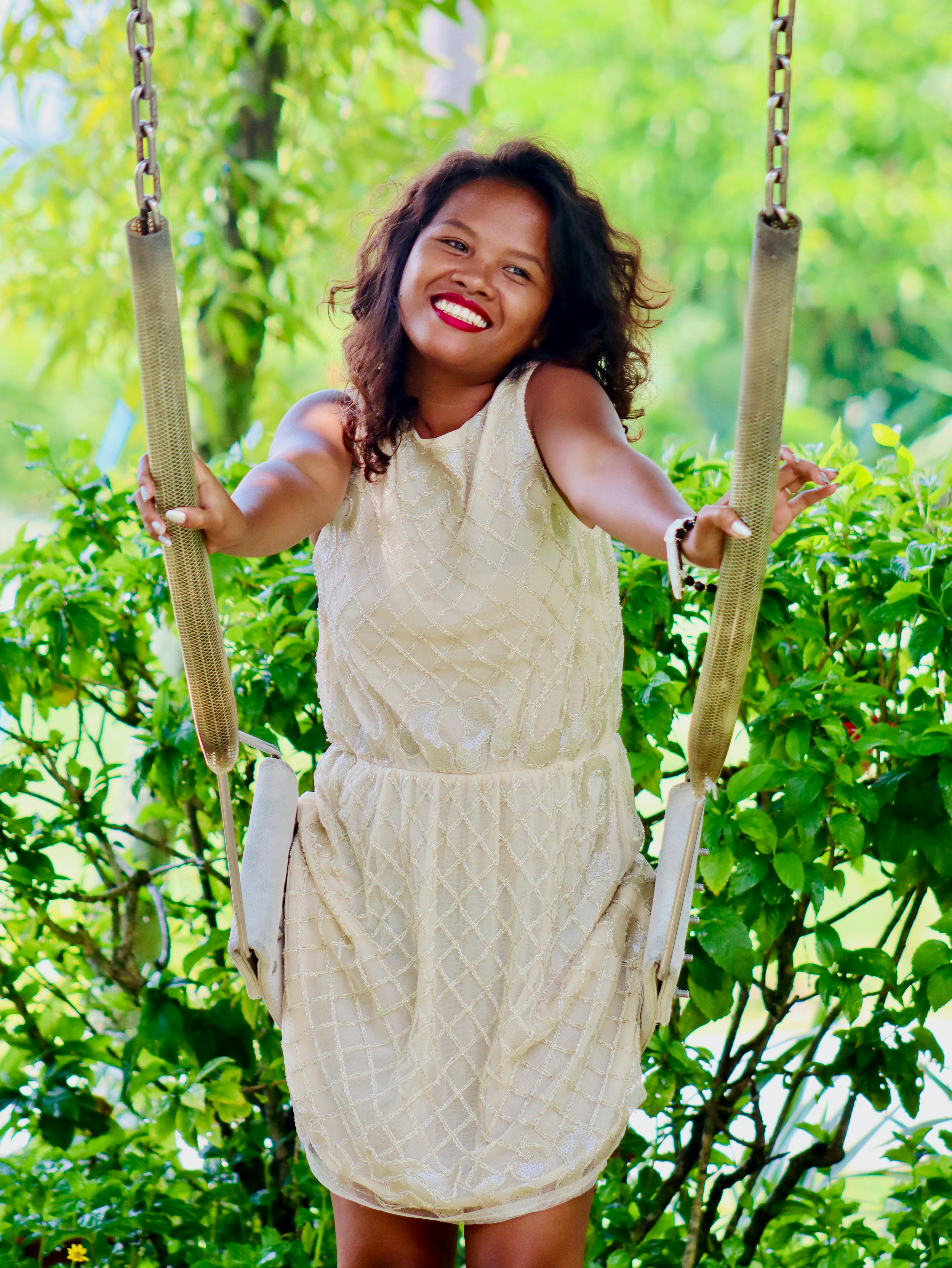 Smiling on Swing · Free Stock Photo