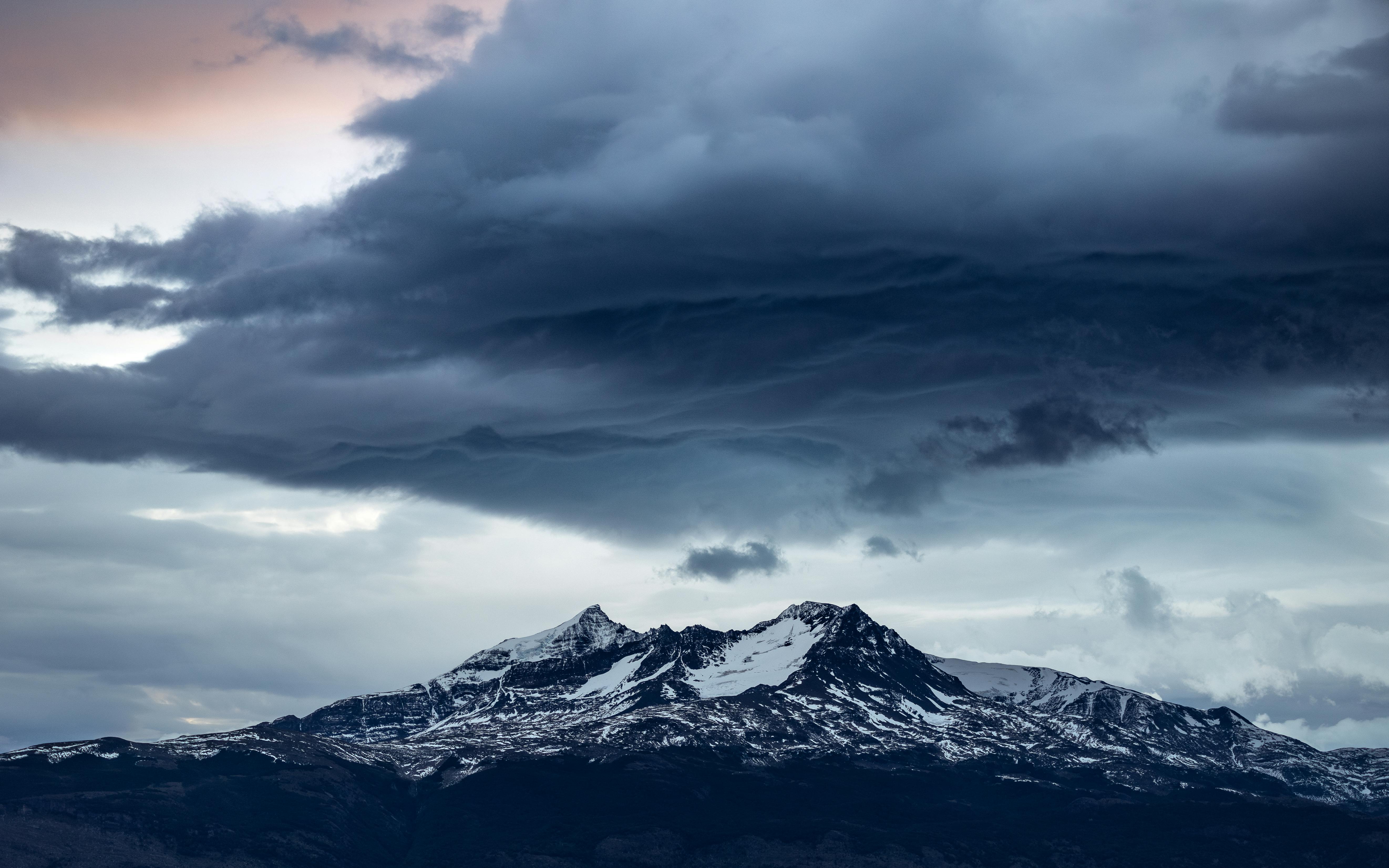 Thick Storm Clouds over Mountains · Free Stock Photo
