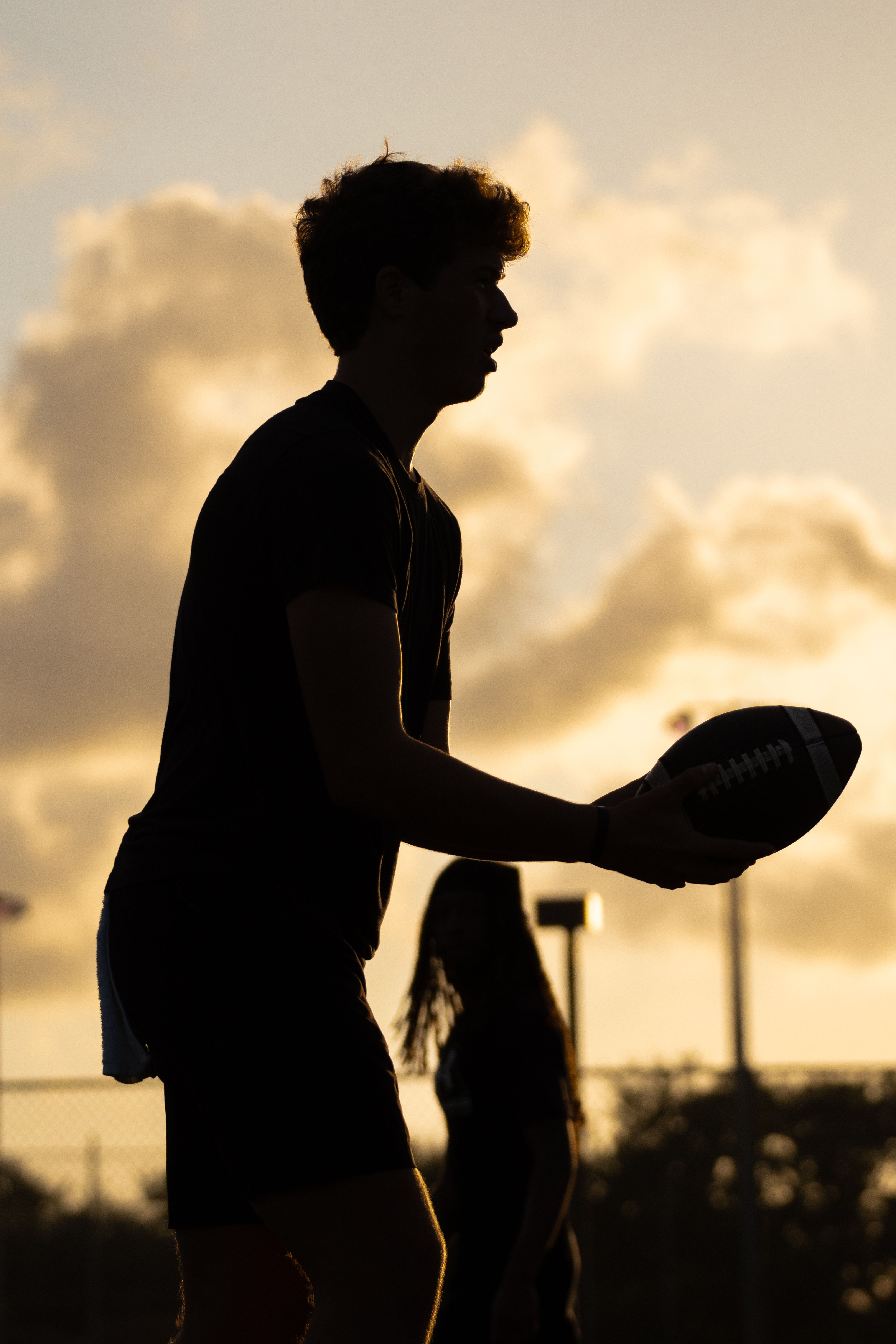 Football at Sunset · Free Stock Photo