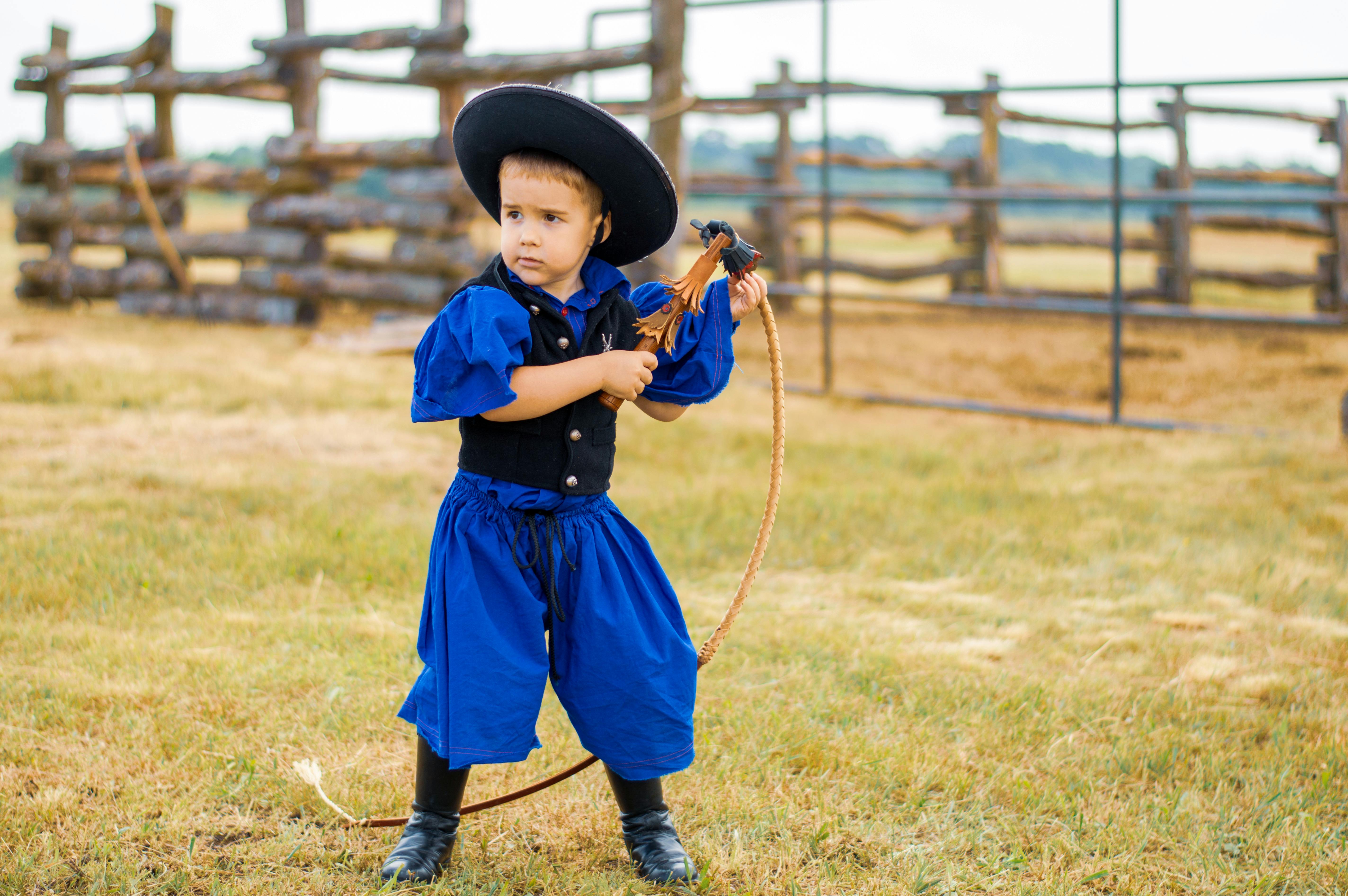 Boy Holding Whip · Free Stock Photo