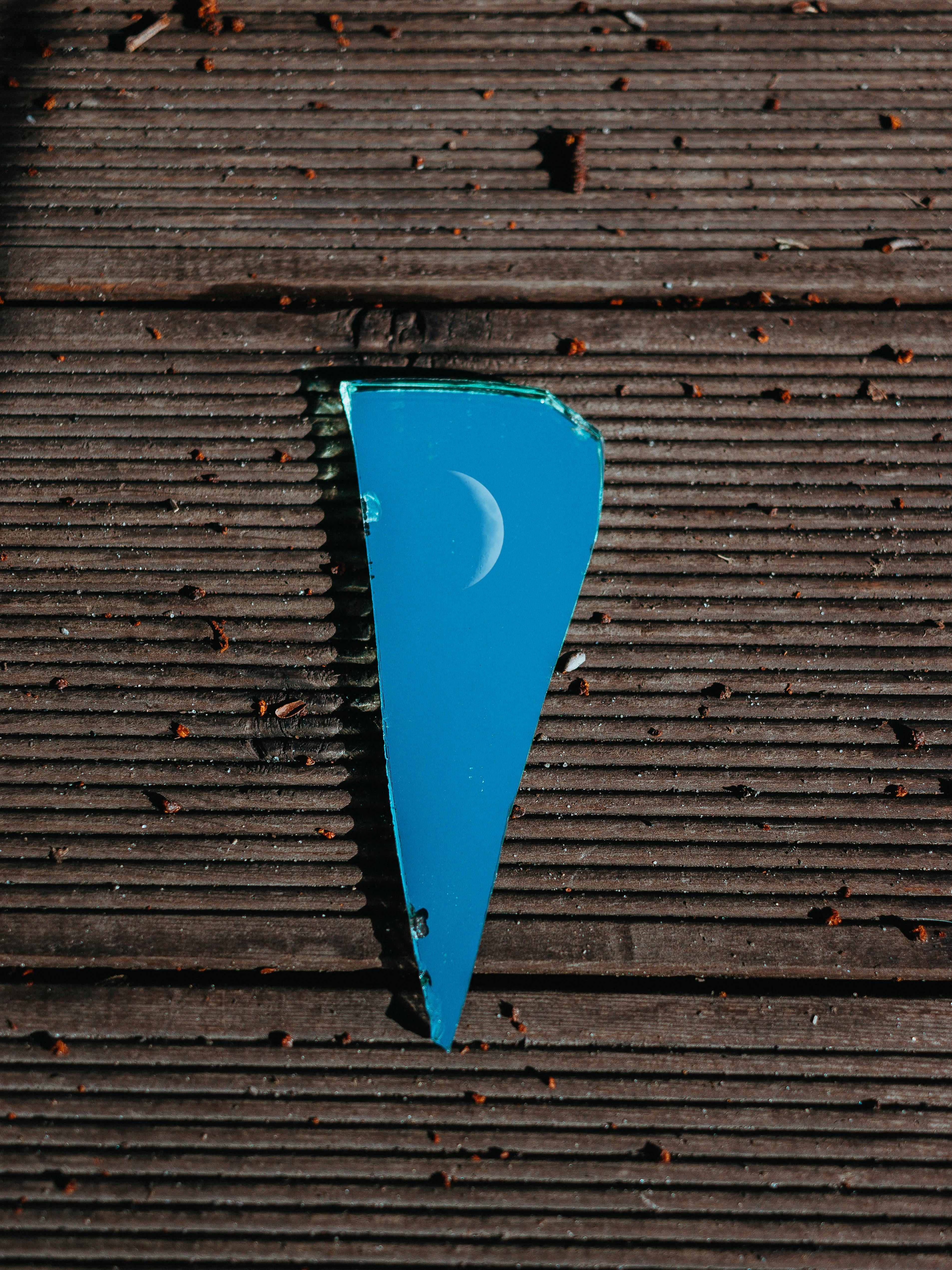 Broken Piece of Mirror Reflecting Moon Visible in Daylight · Free Stock ...