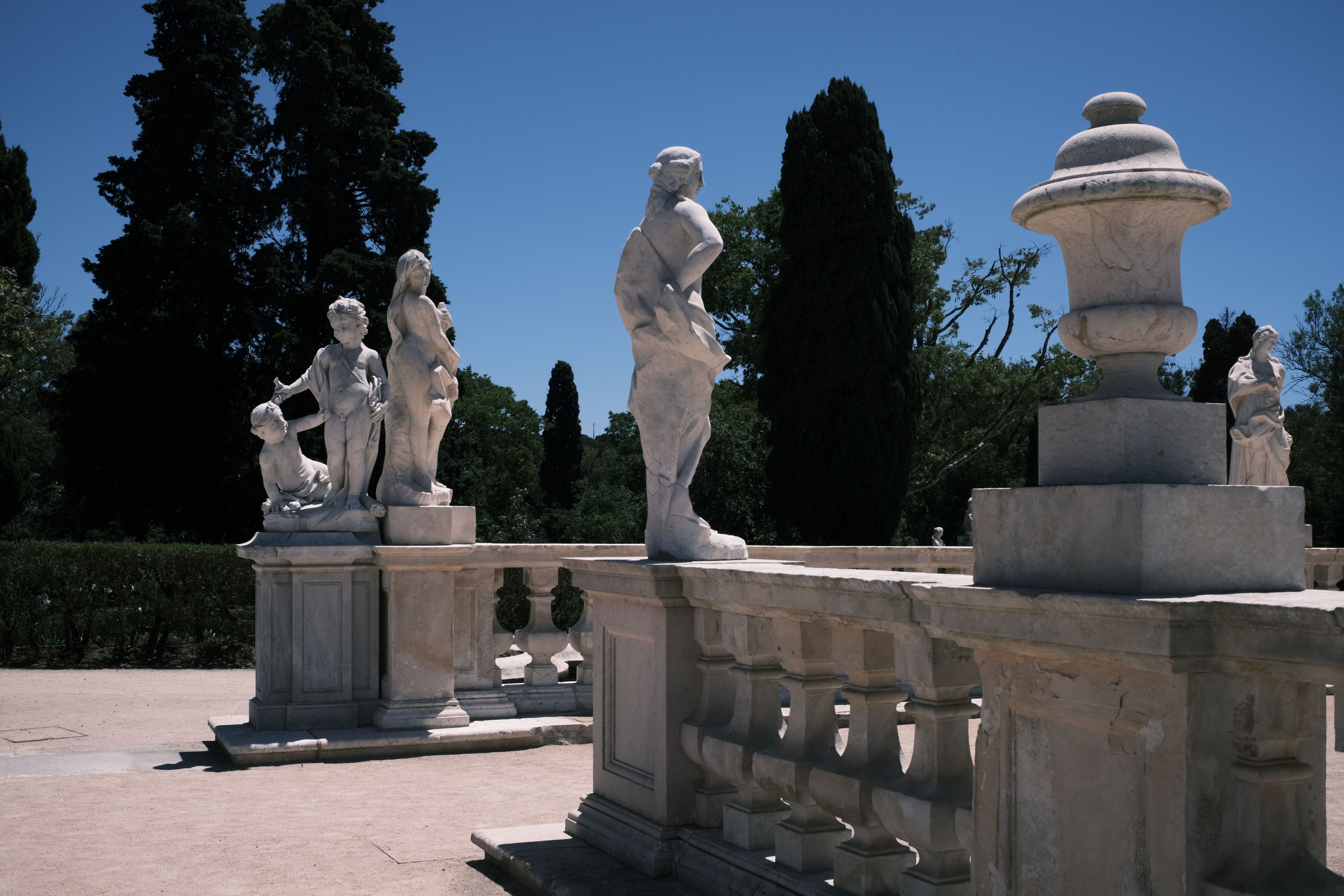 Statues in a Garden · Free Stock Photo