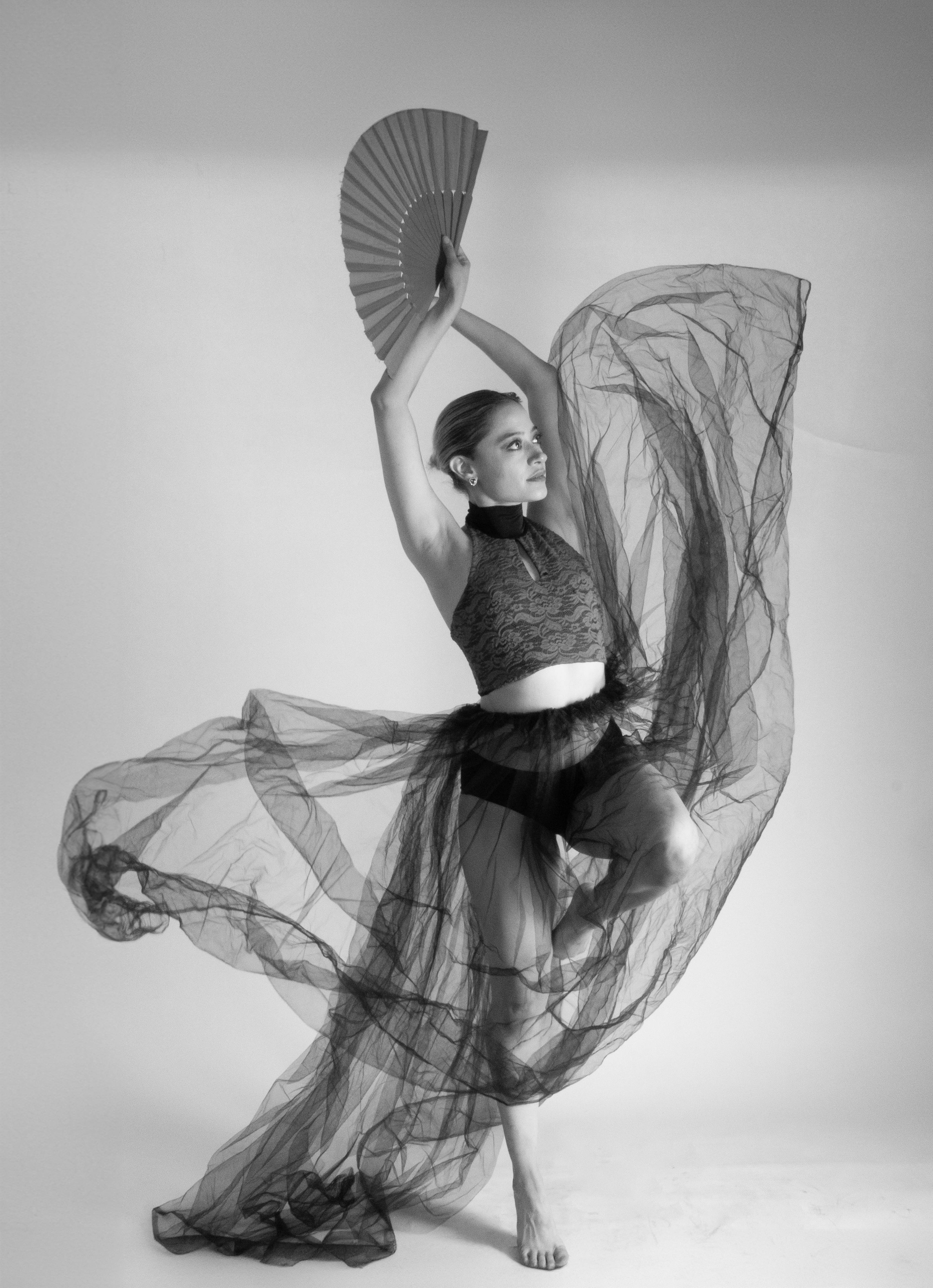 Dancing Ballerina with Fan · Free Stock Photo