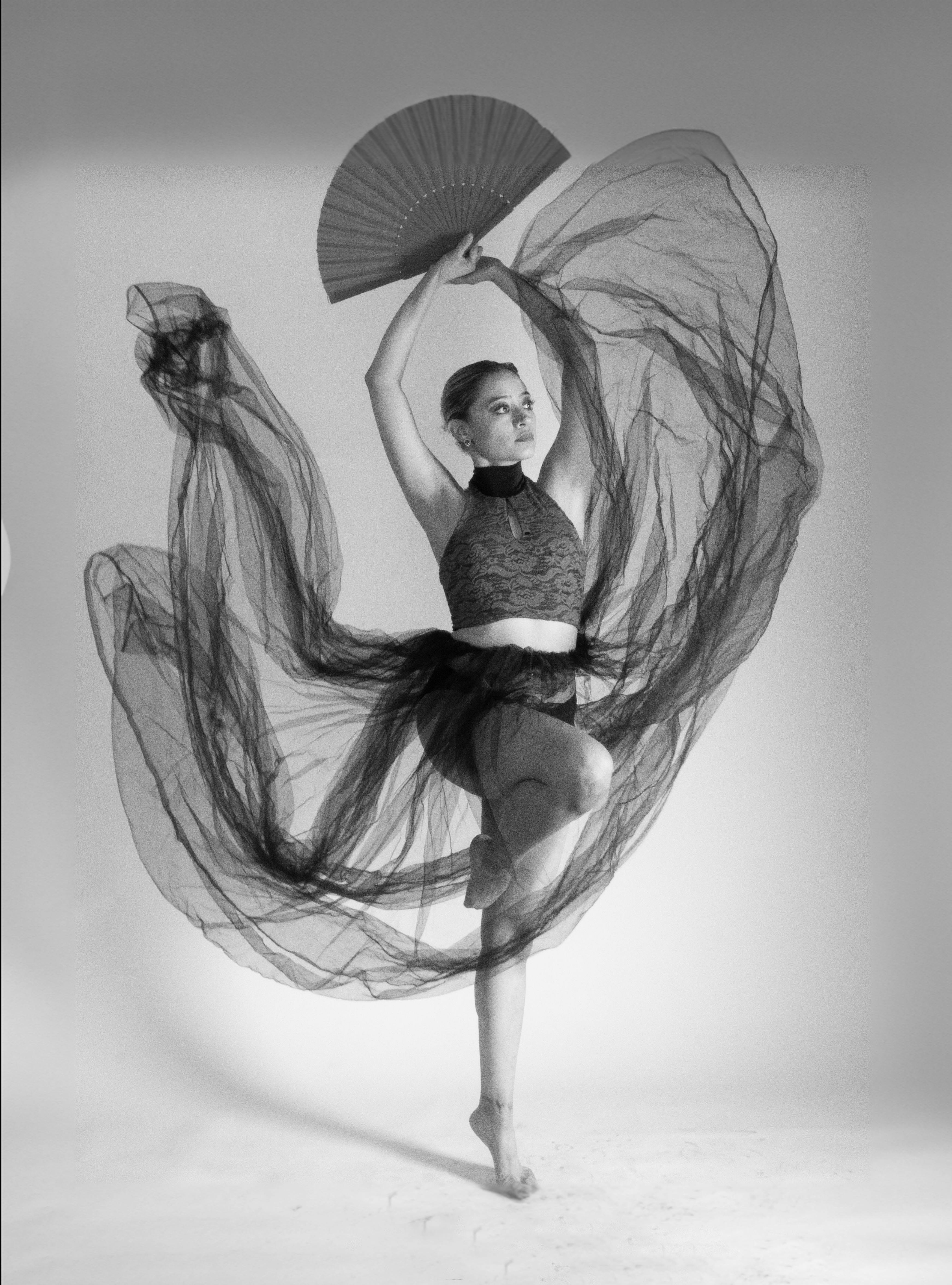 Ballerina Dancing in Skirt and with Fan · Free Stock Photo