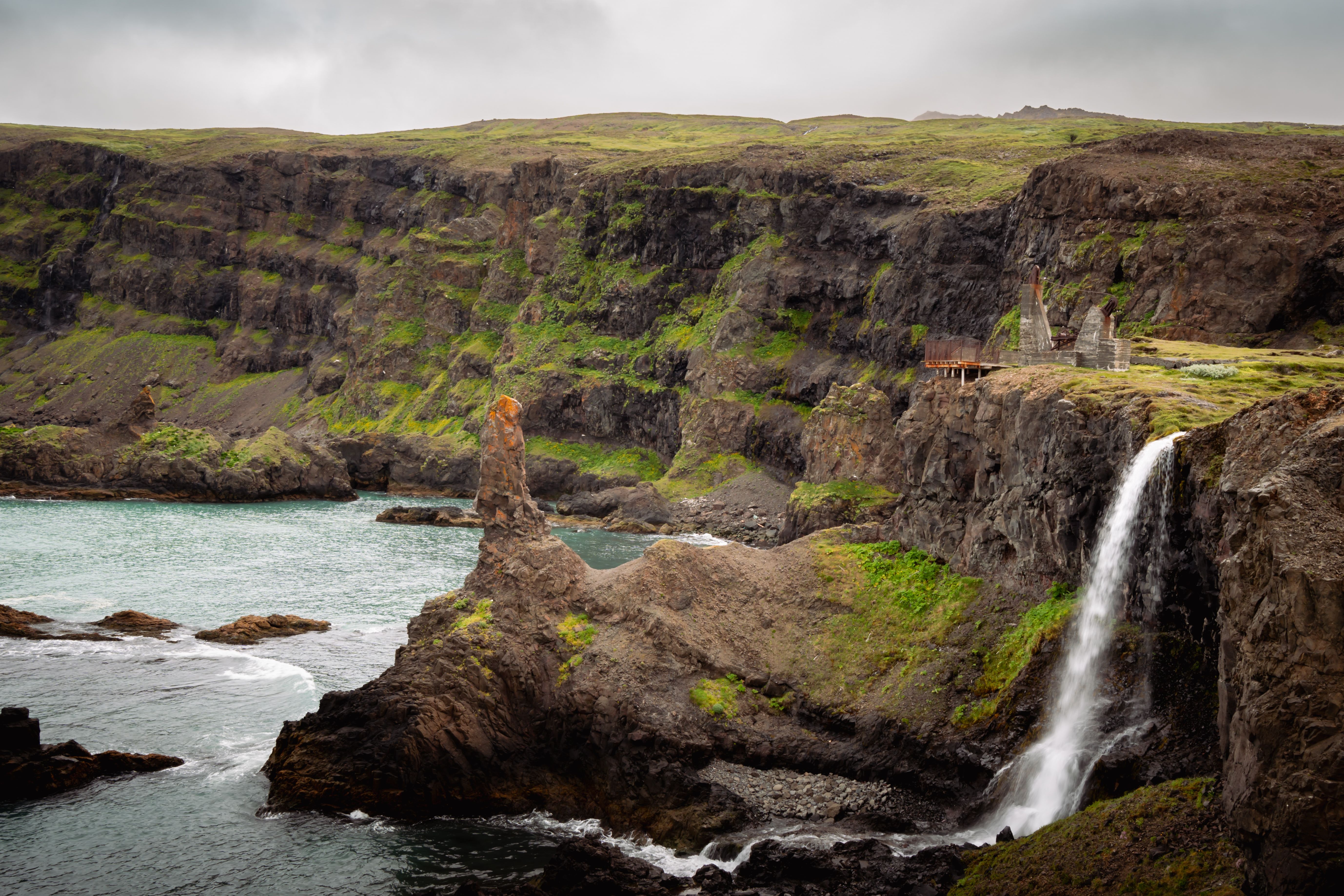 Rocky Cliff with Waterfall and Scenic Viewpoint in Iceland · Free Stock ...