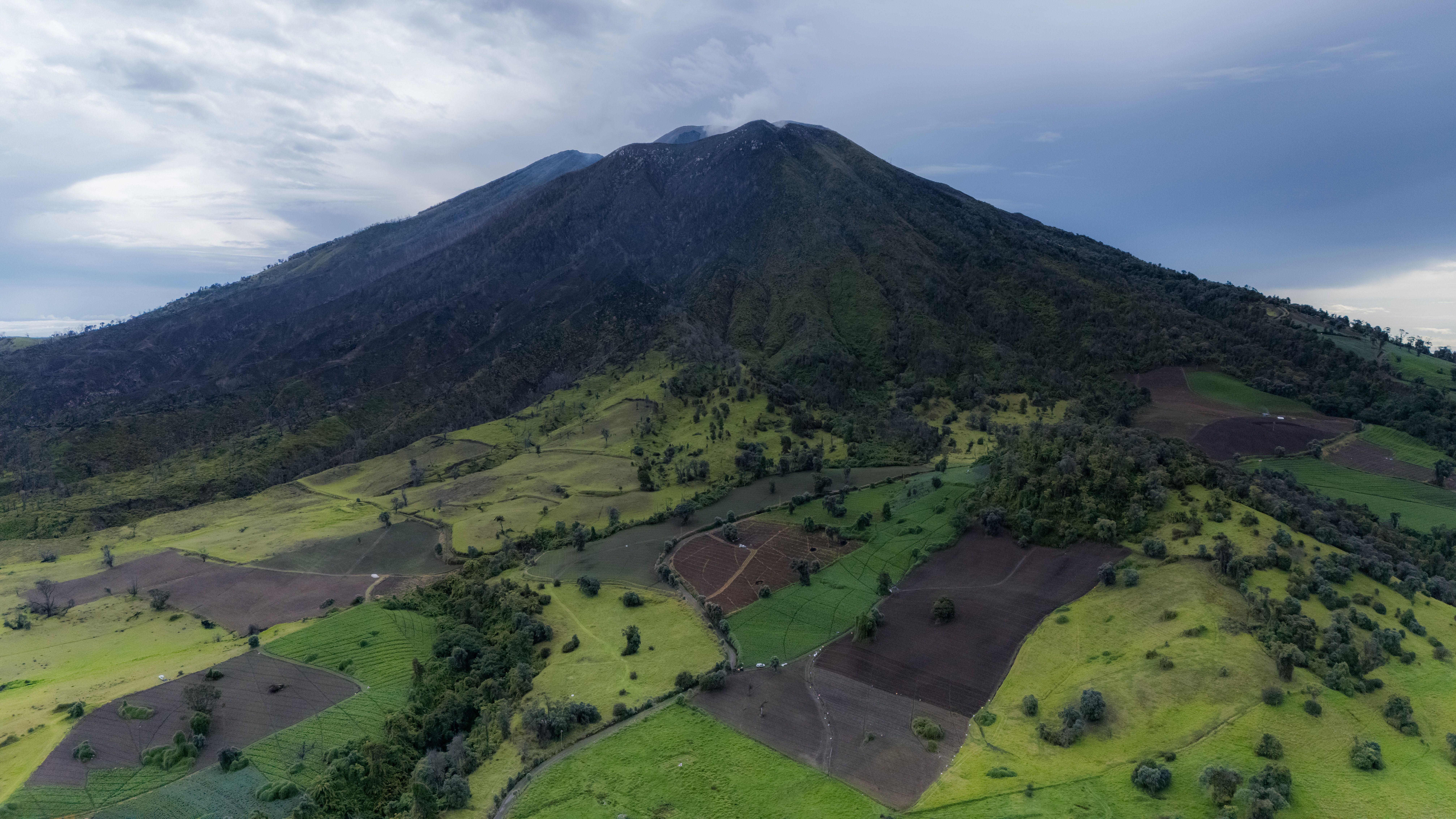 Green Fields and Volcano Mountain in Countryside · Free Stock Photo