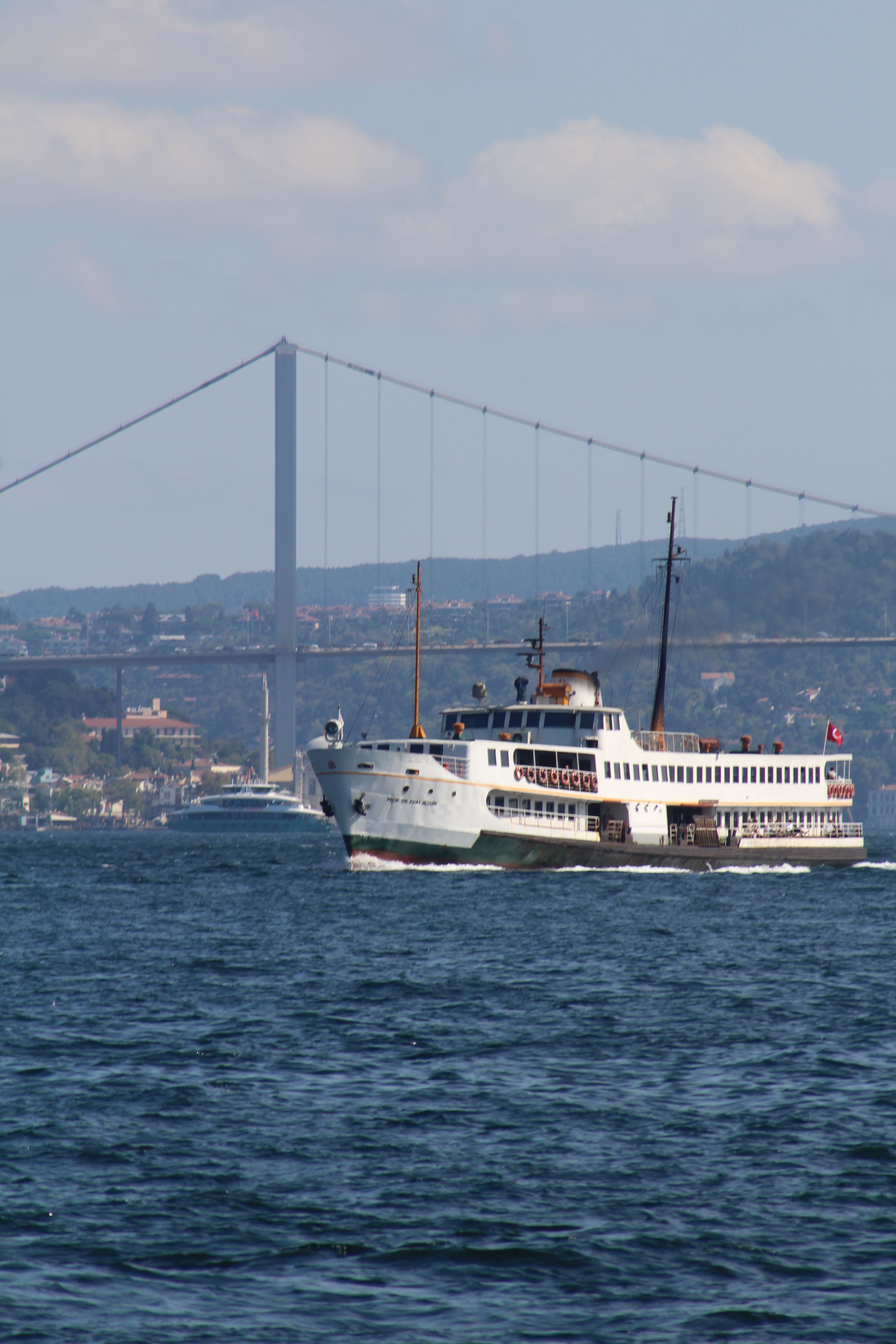 A Ferry Near a Bridge · Free Stock Photo