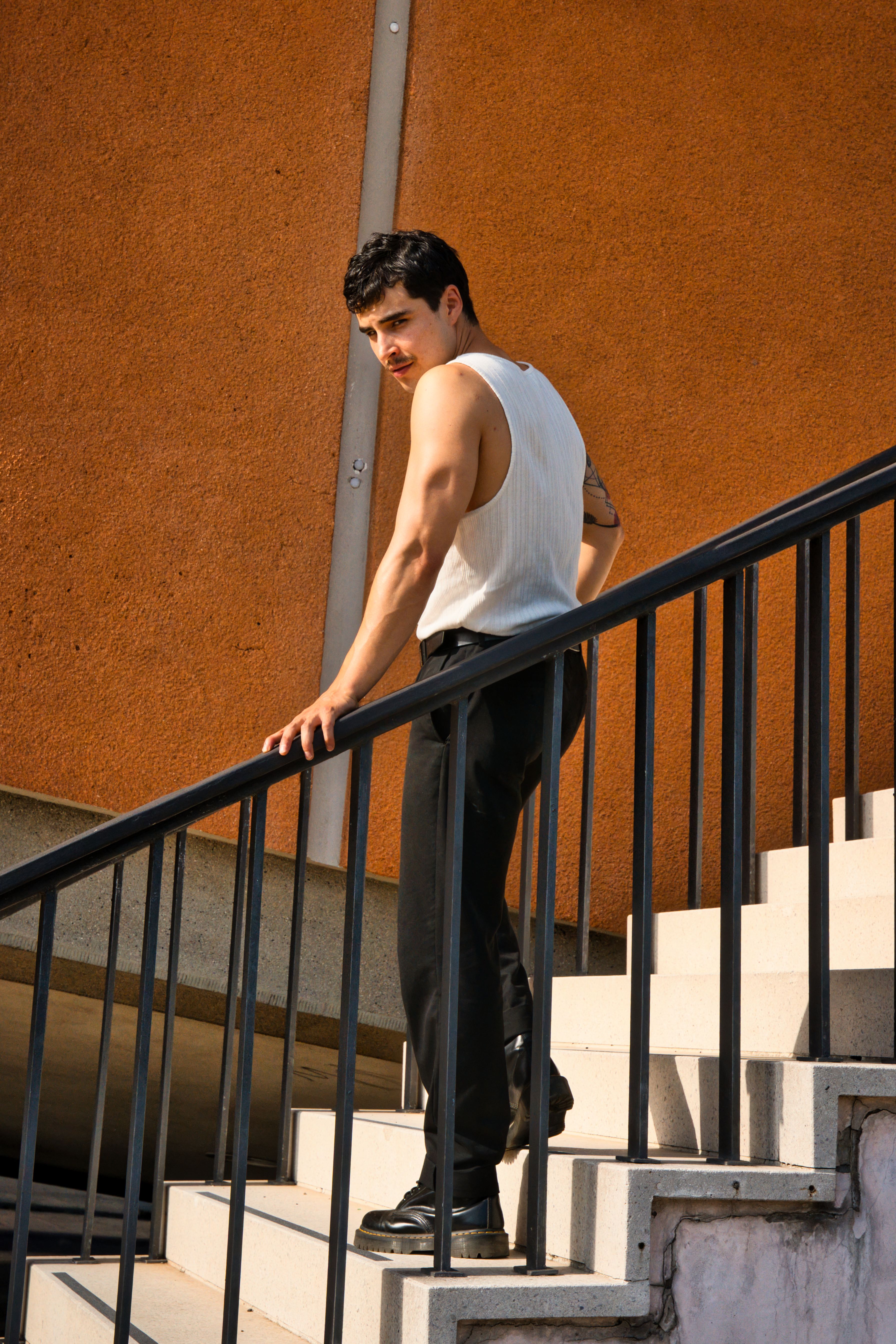 Man Standing on Stairs · Free Stock Photo