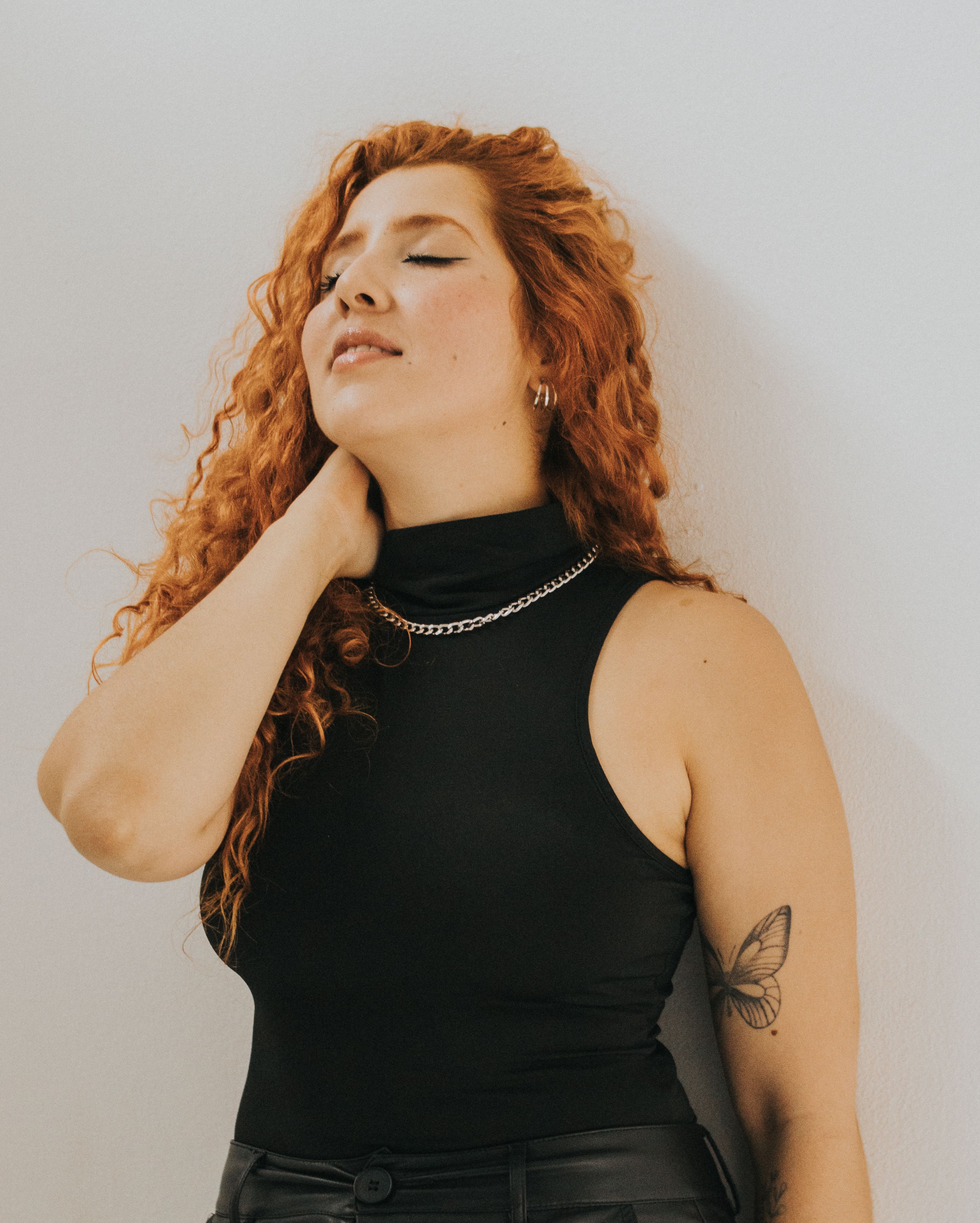 Woman Wearing Black Spaghetti Strap Top · Free Stock Photo