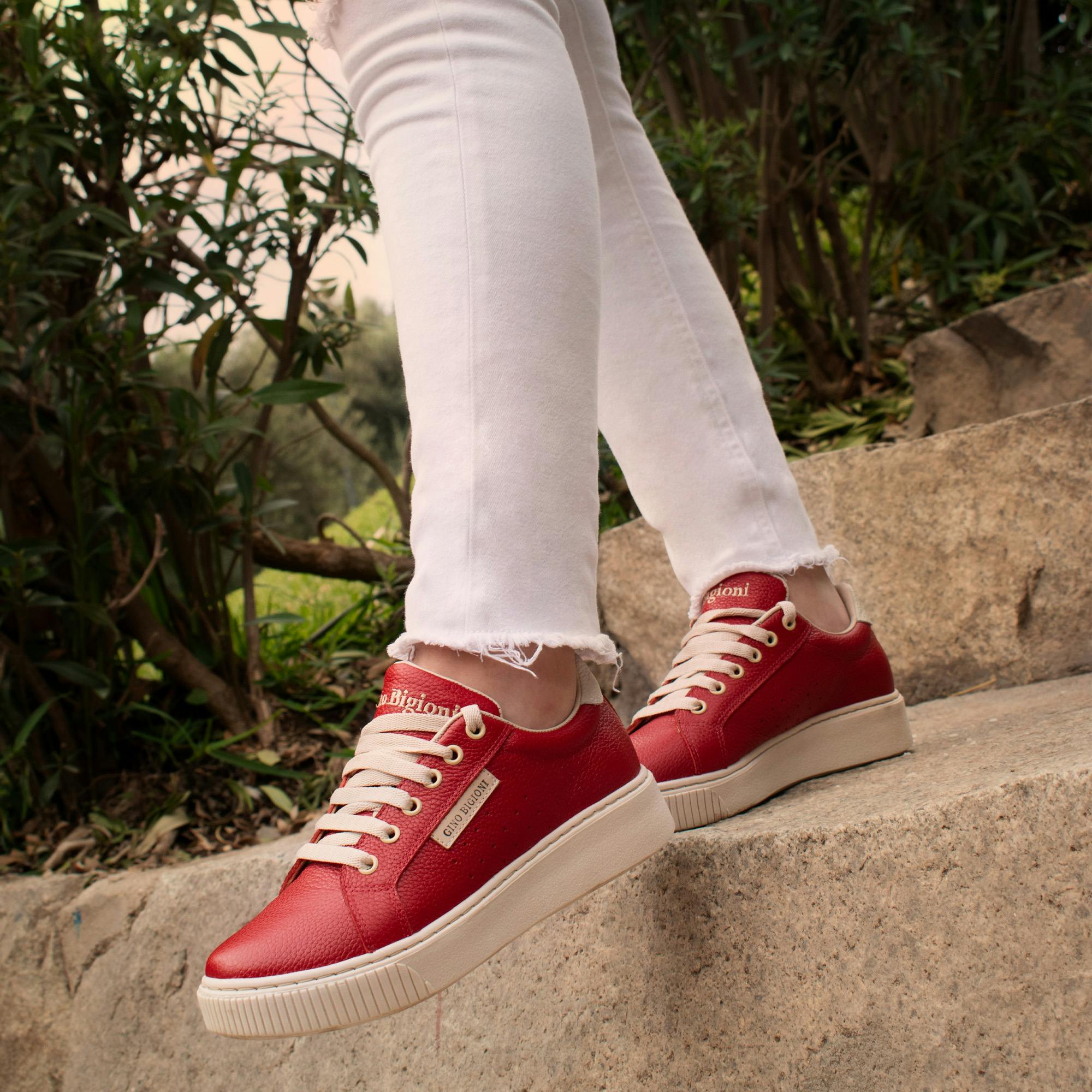 Legs in Red Leather Sneakers Walking down Steps · Free Stock Photo