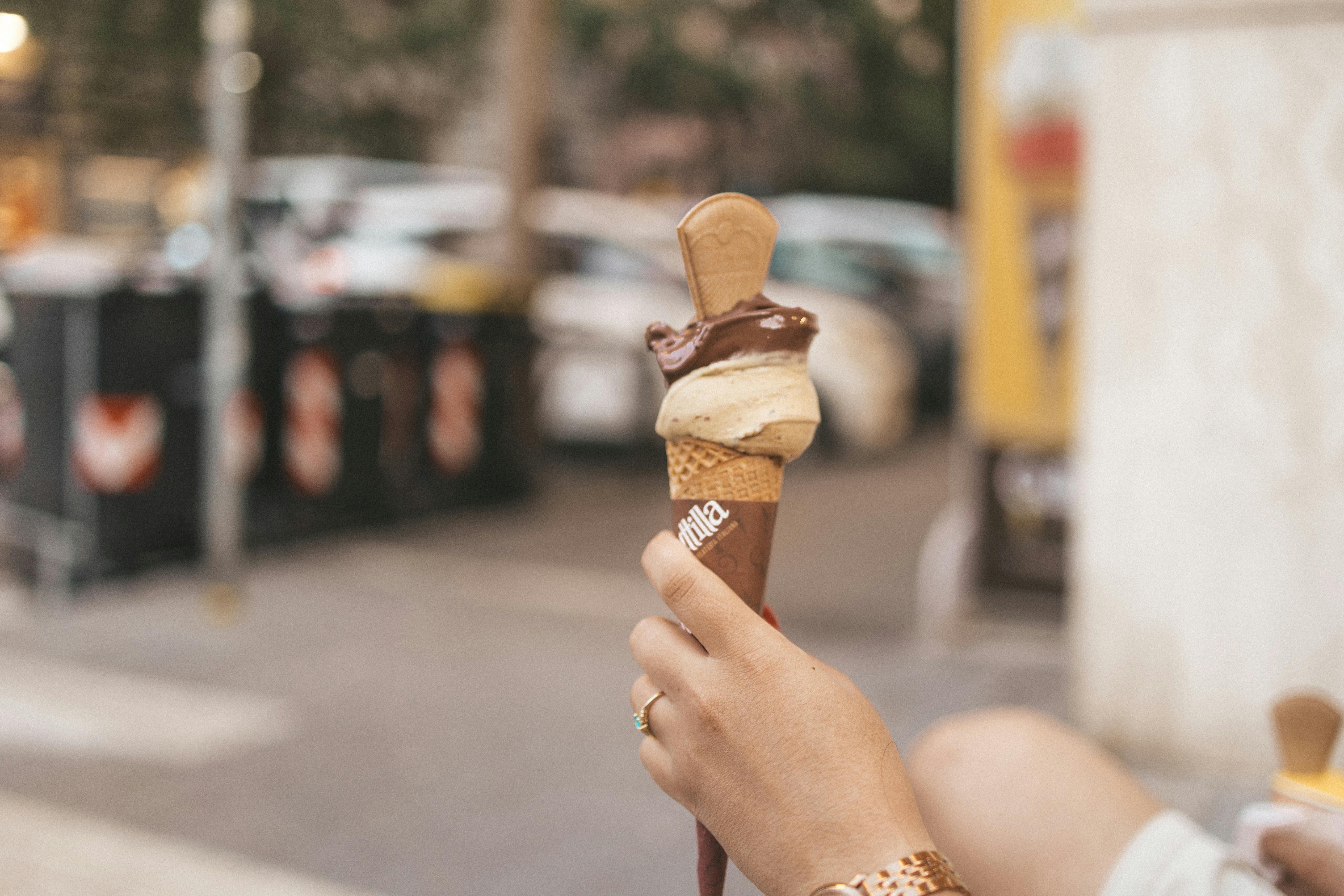Photography of Person Holding Two Ice Cream · Free Stock Photo
