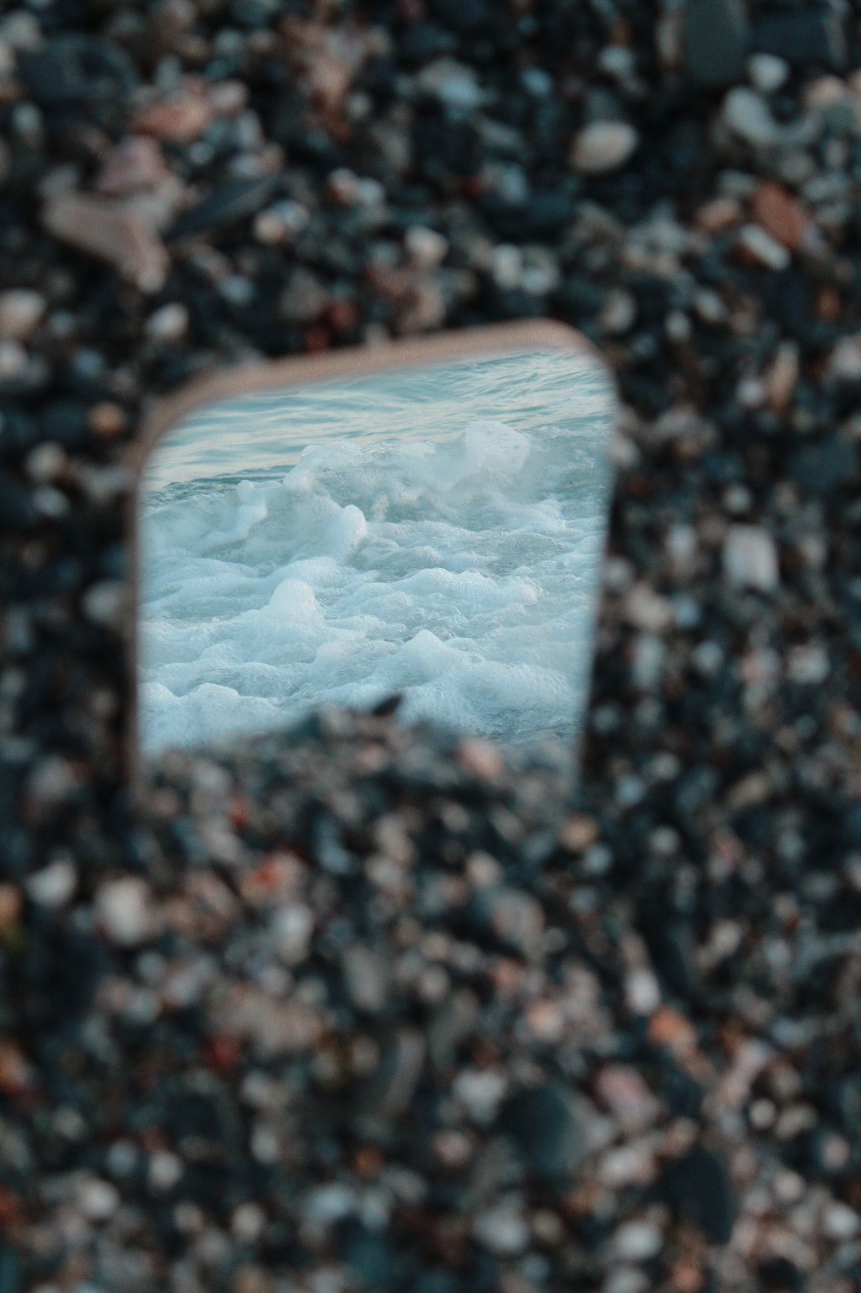 Reflection of the Sea in the Mirror Standing on the Beach · Free Stock ...