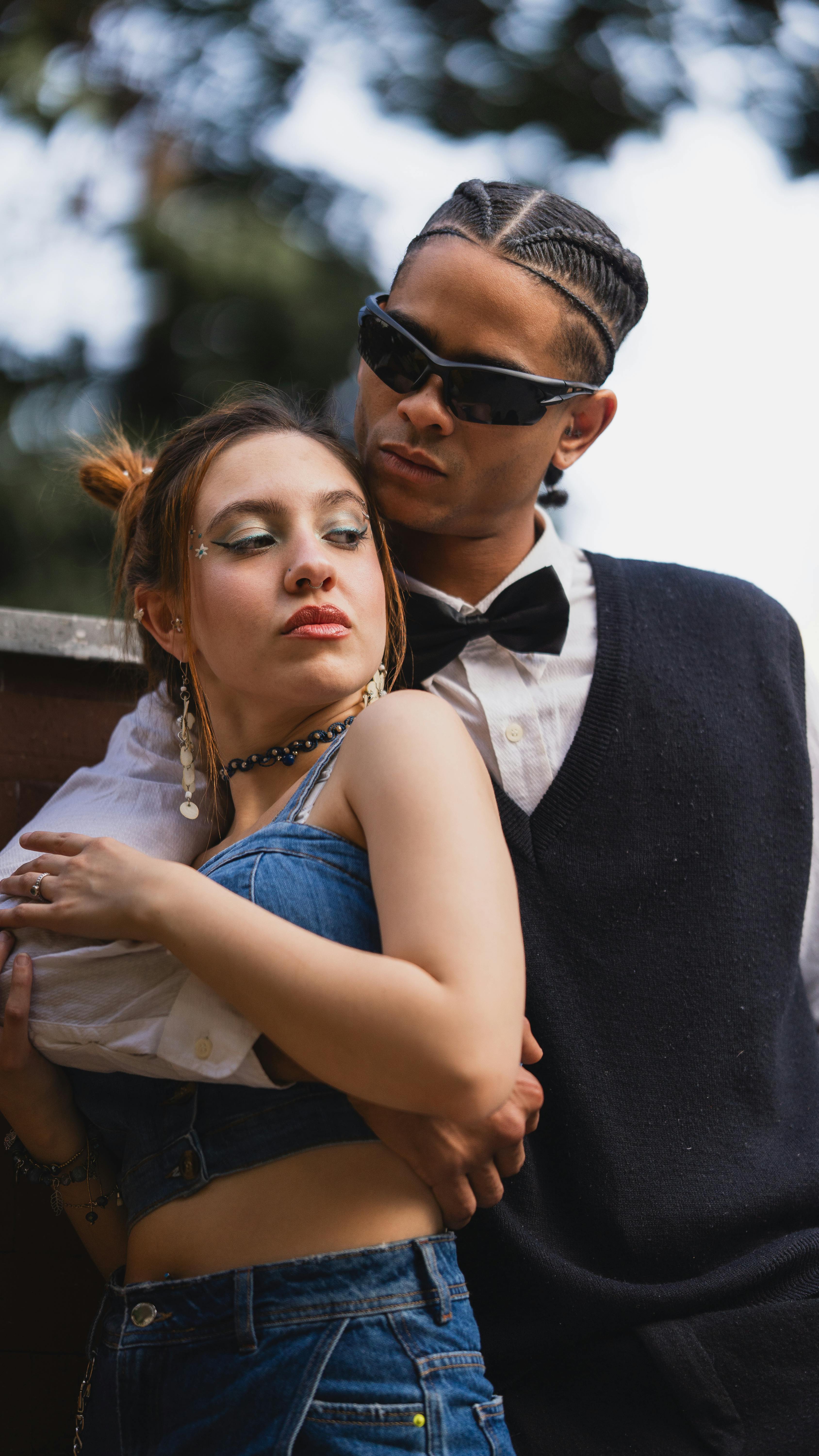 Model Wearing Bow Tie Posing with Model Wearing Denim Top · Free Stock ...
