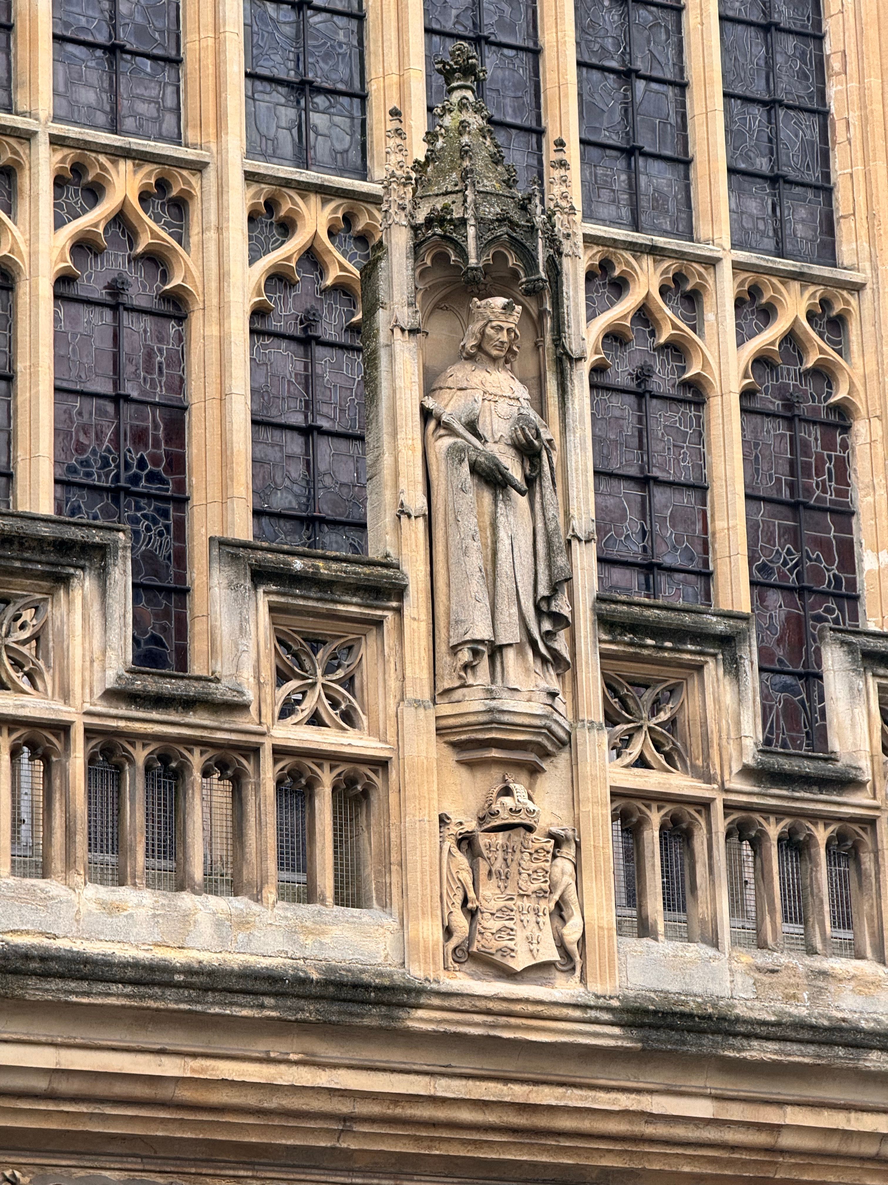 Statue on Wall of Church · Free Stock Photo