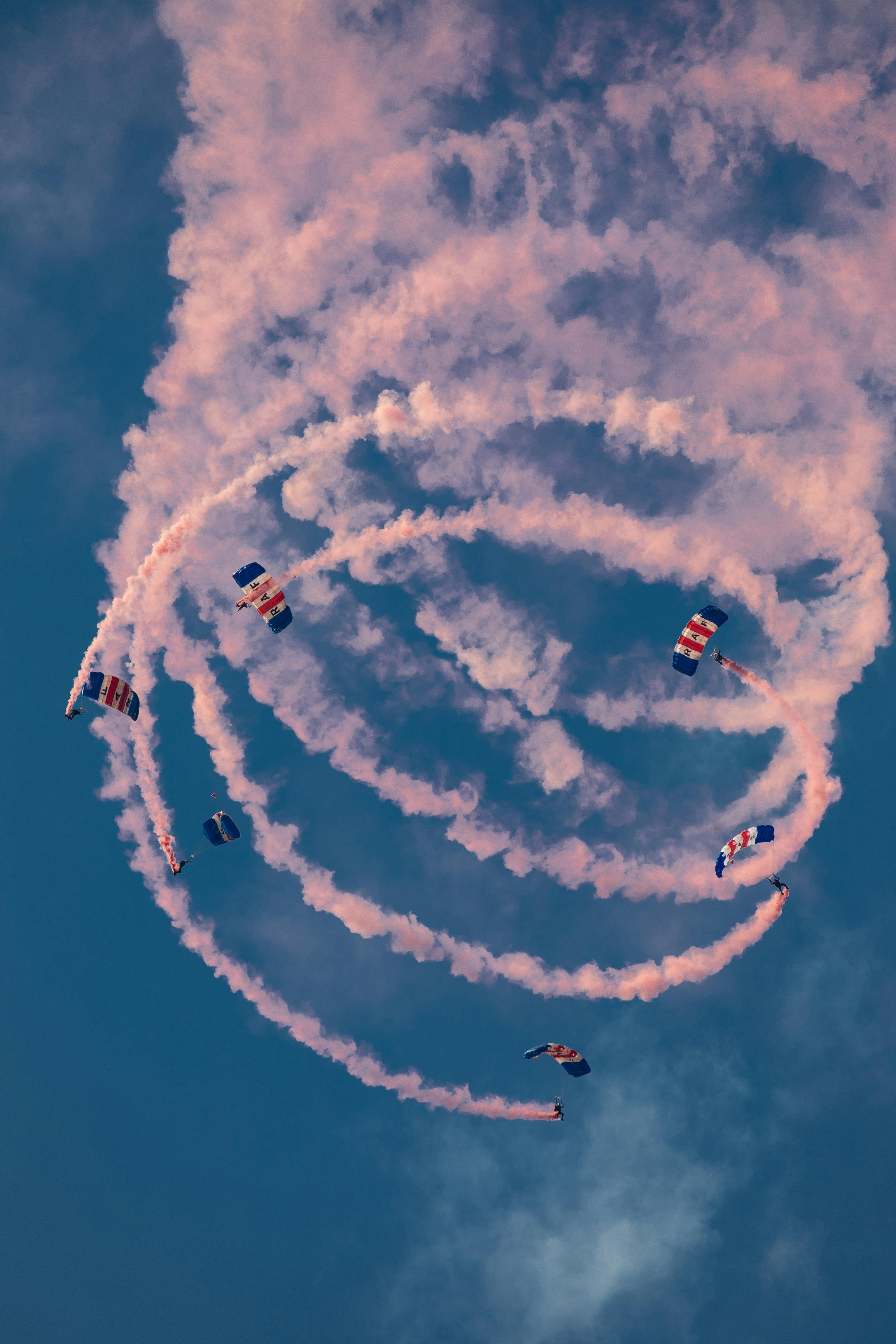 People Parachuting with Smoke · Free Stock Photo