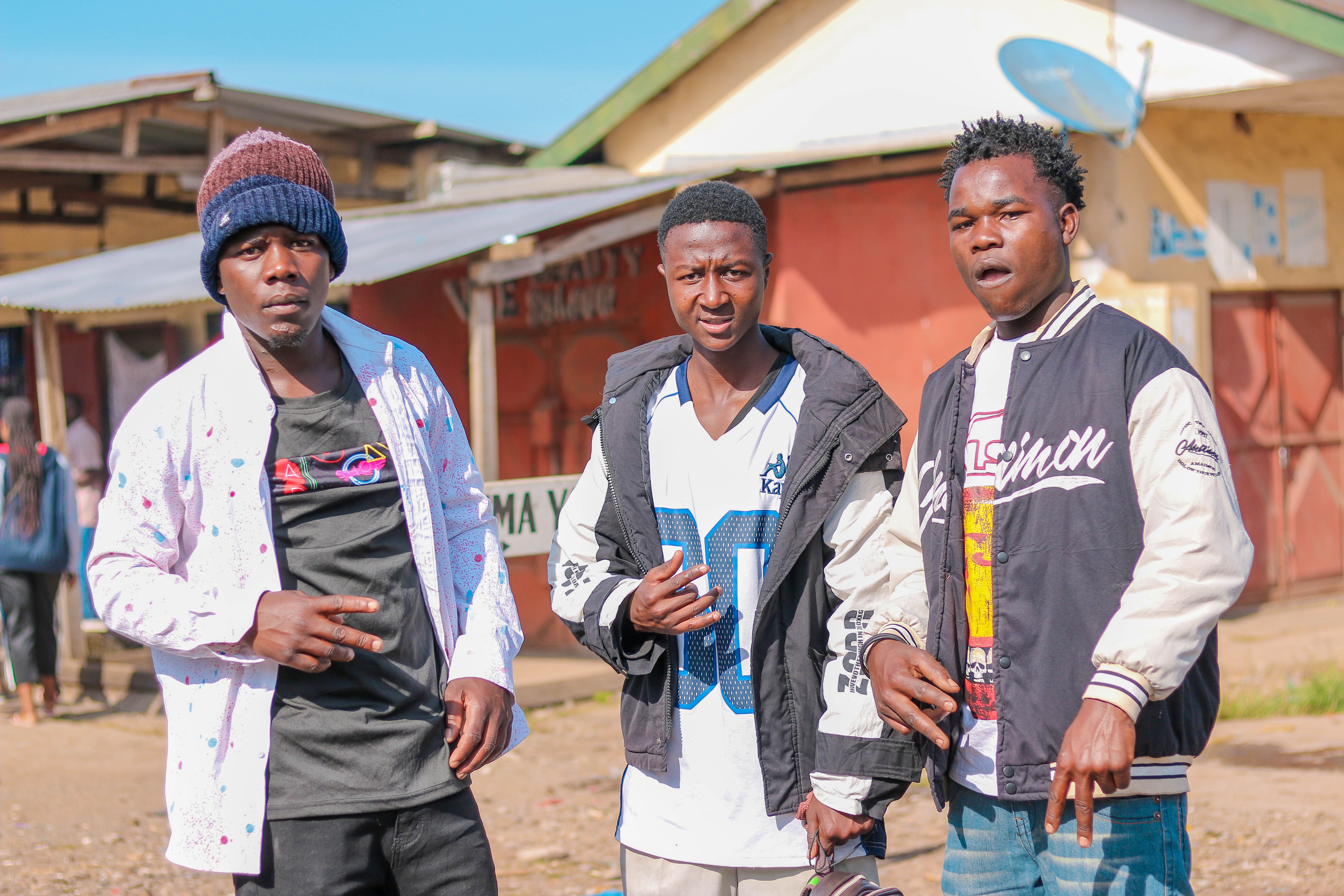 Portrait of Men in Jackets in Village · Free Stock Photo
