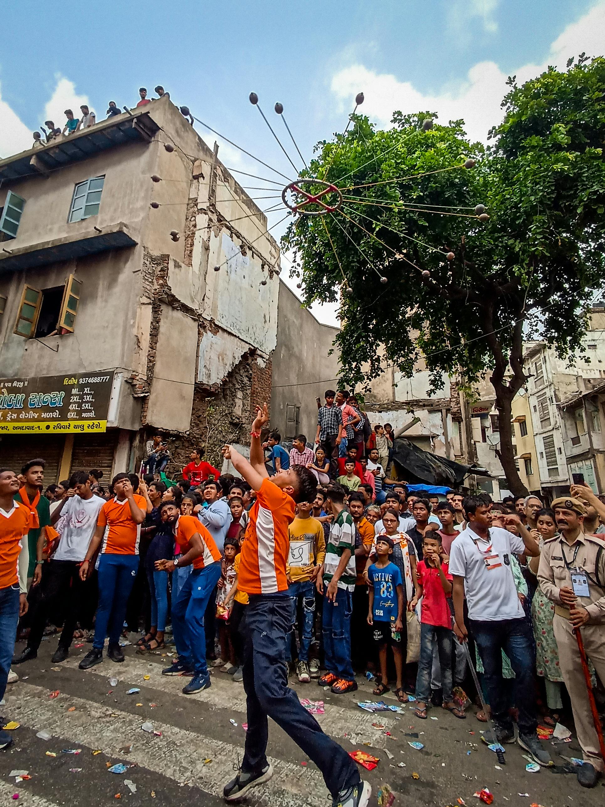 Group of People Watching a Man Dancing in the Street · Free Stock Photo