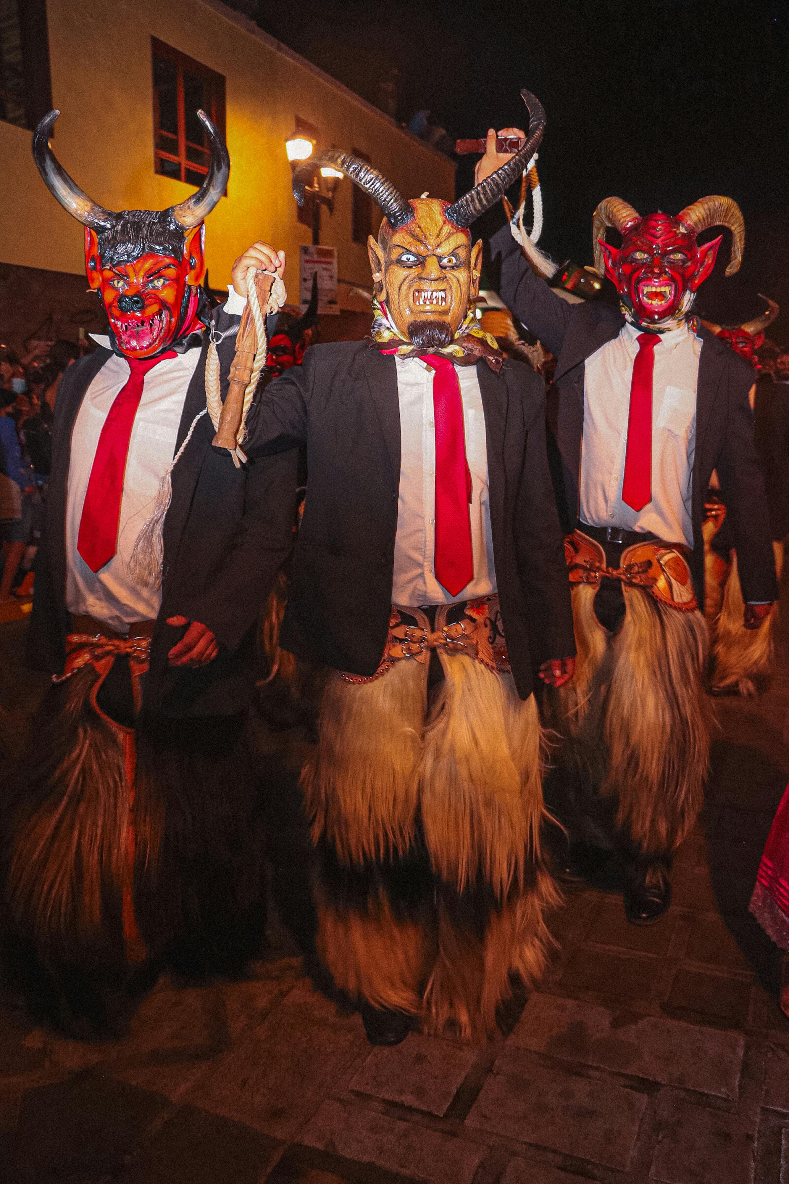 Men in Suits and Devil Masks · Free Stock Photo