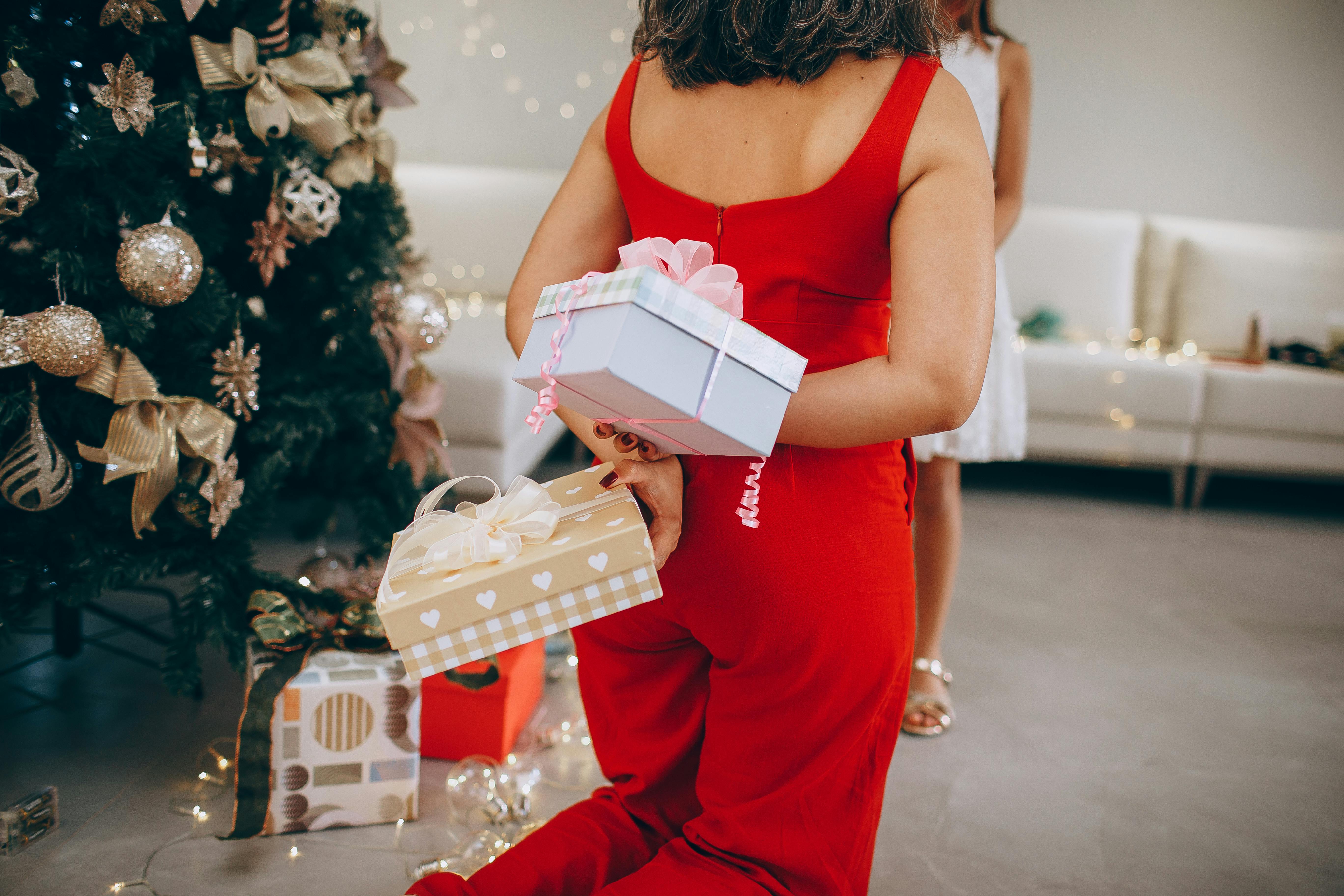 Person Giving A Gift Box · Free Stock Photo