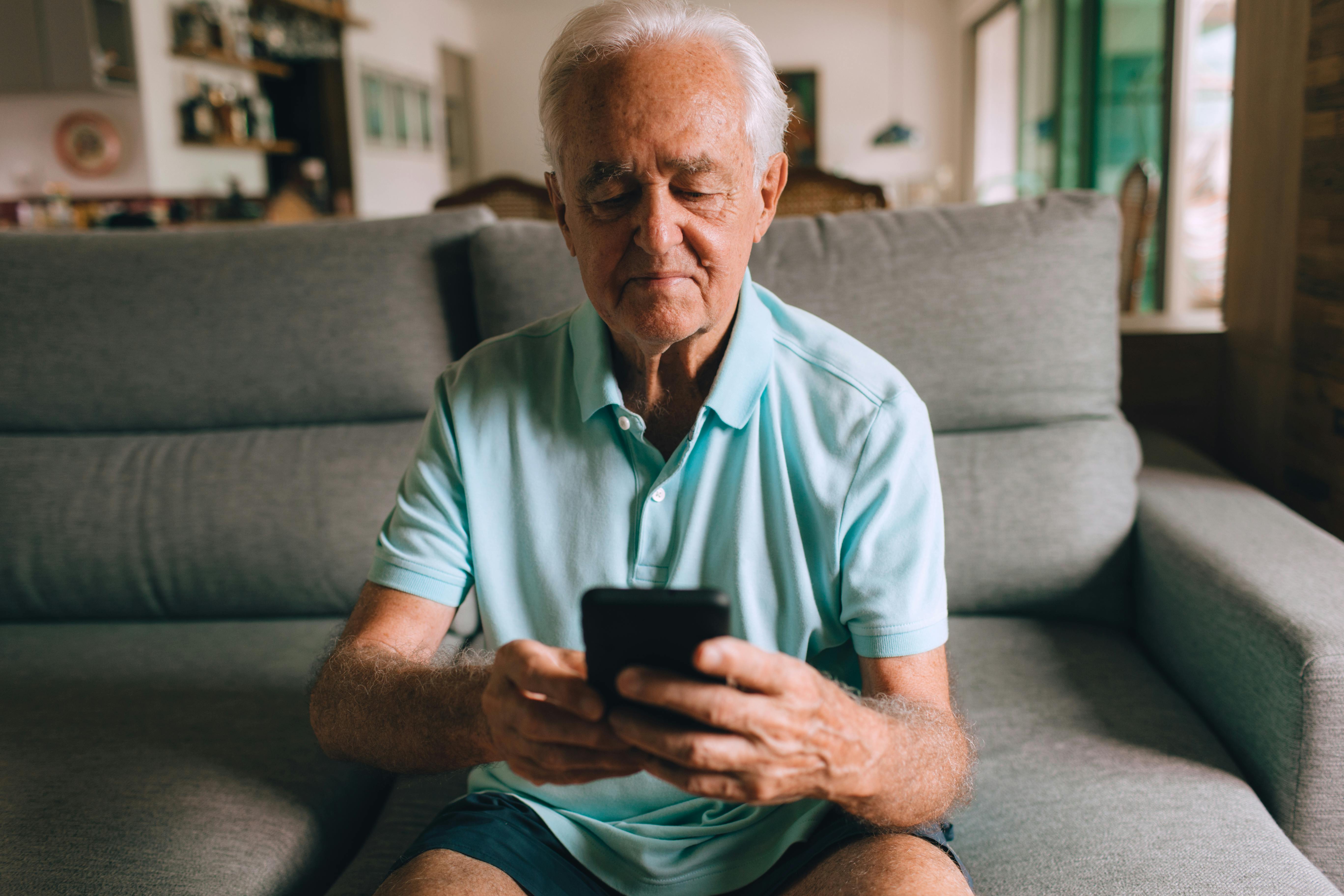 Daughter explaining elderly mother how using smartphone · Free Stock Photo