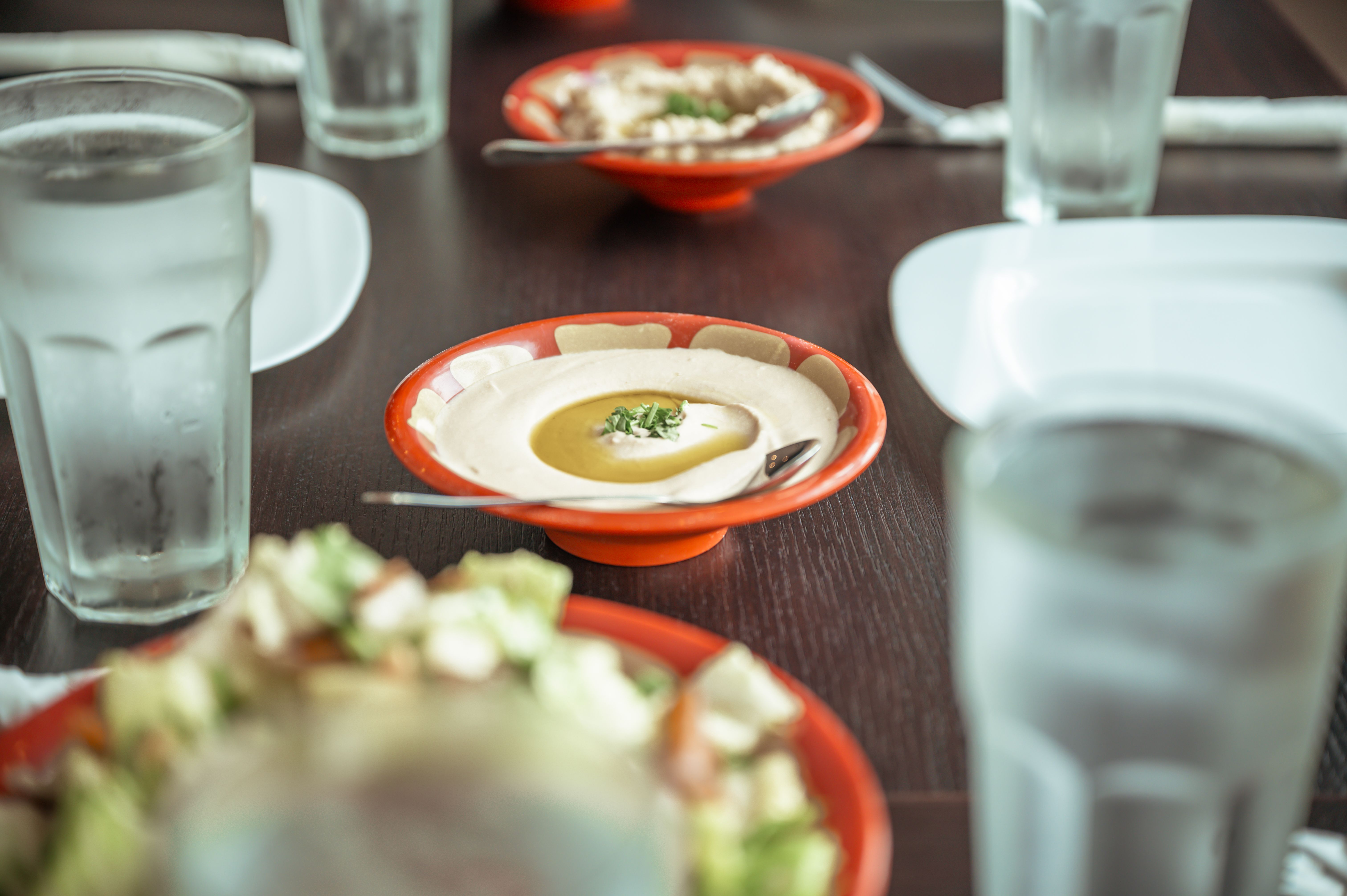 Close-up of a Set Table with Food and Glasses of Cold Water · Free ...