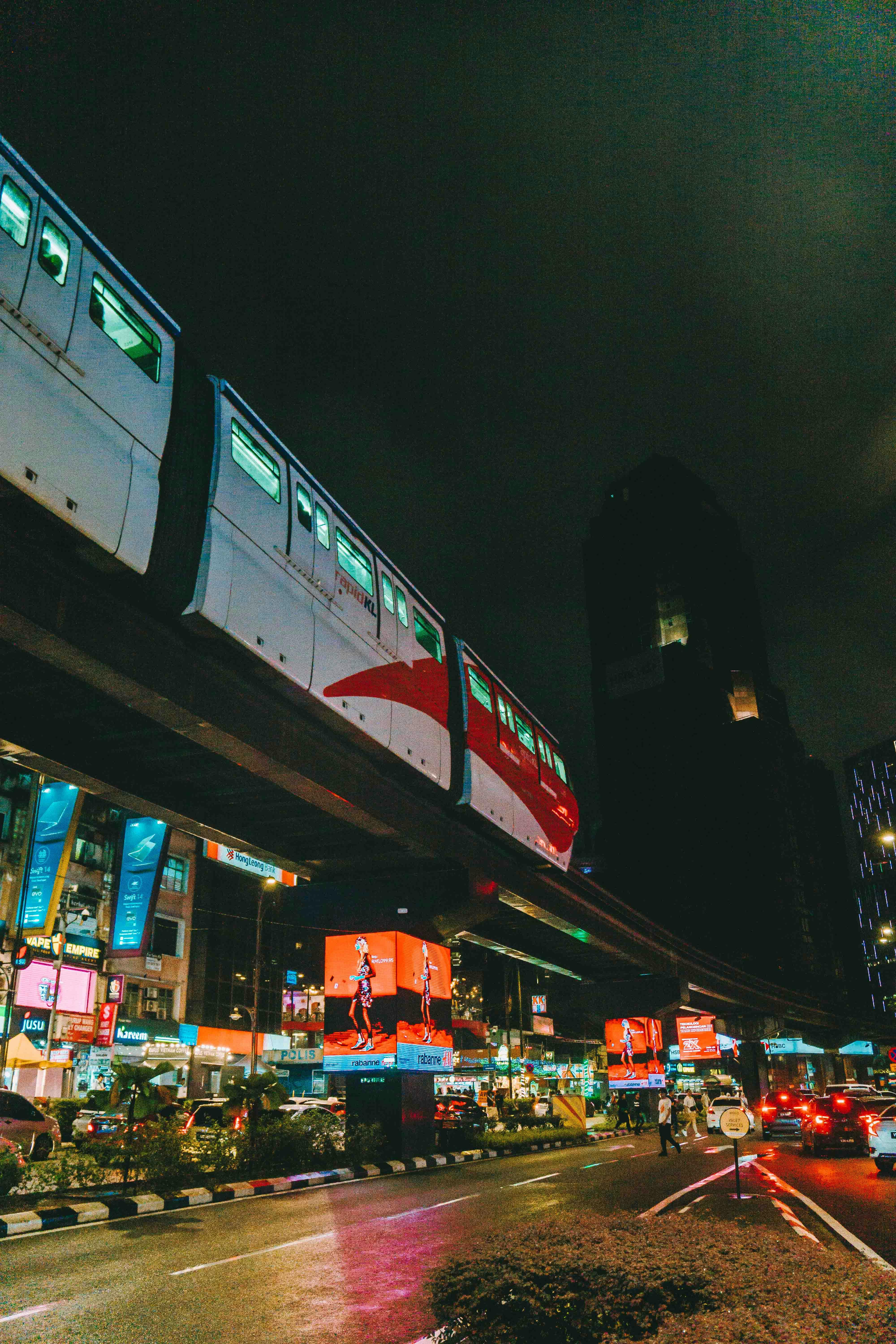 Subway Train Passing over a Street at Night · Free Stock Photo