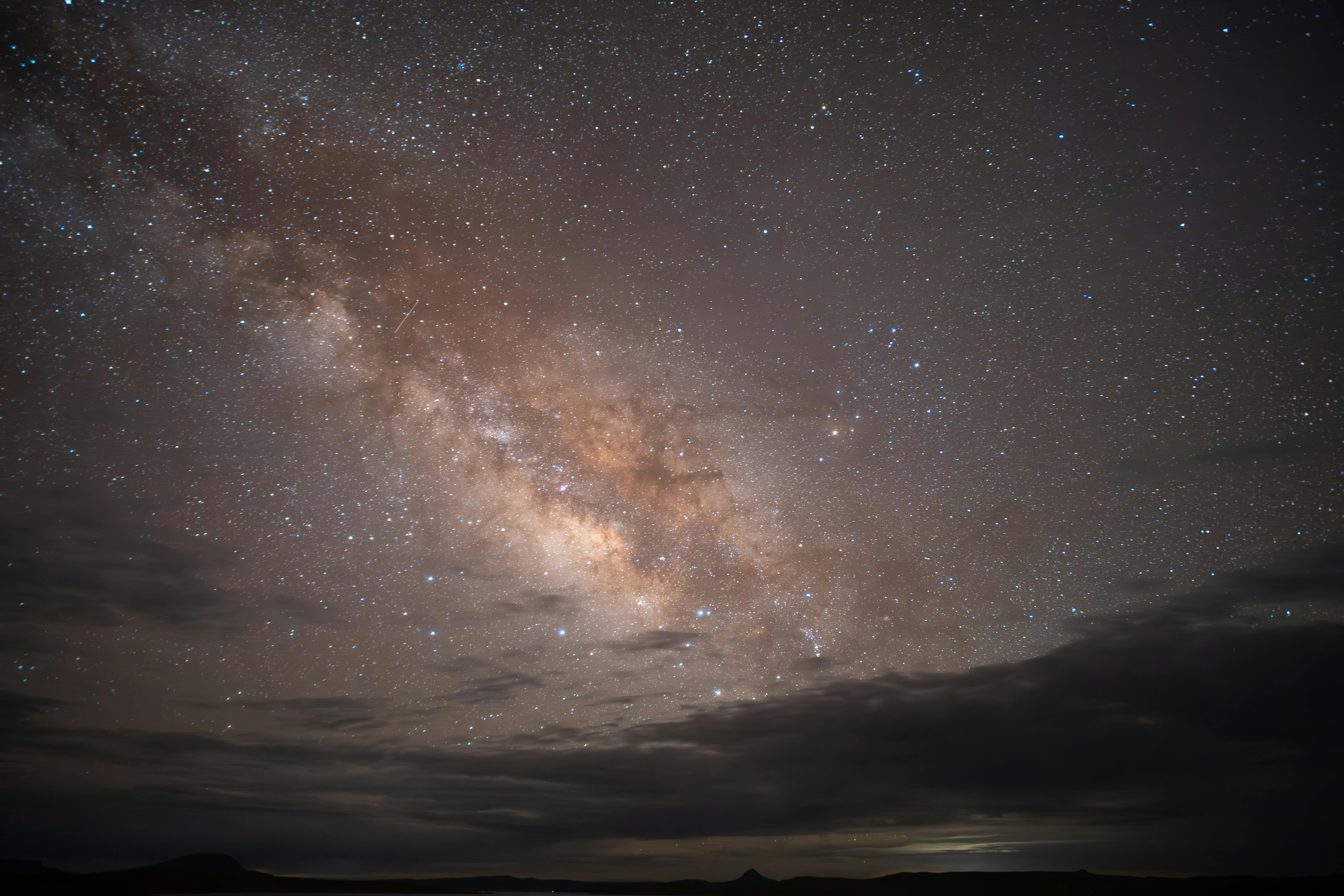 Sky Filled with Stars and Milky Way Visible at Night · Free Stock Photo