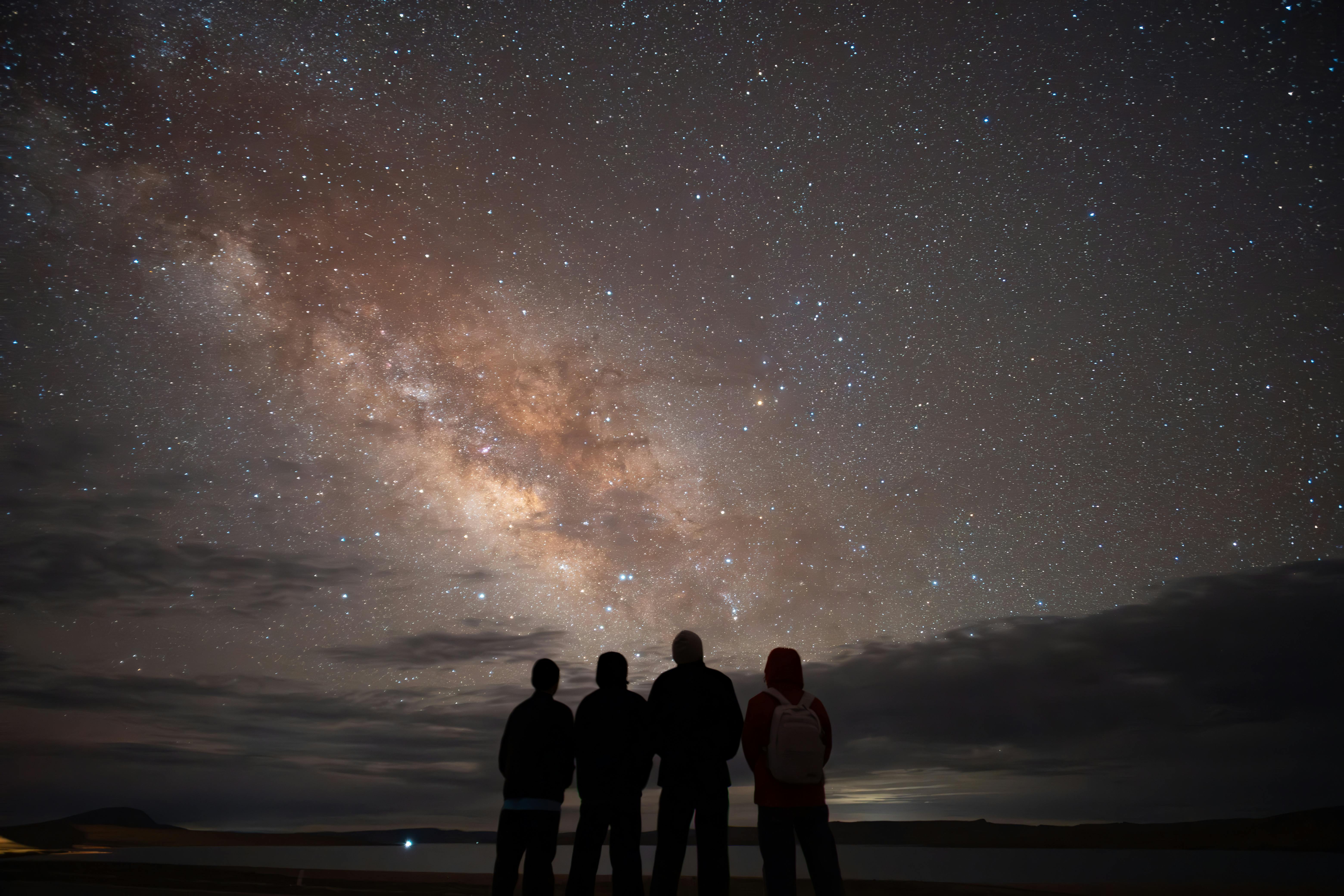 People Standing under Stars in Night Sky · Free Stock Photo