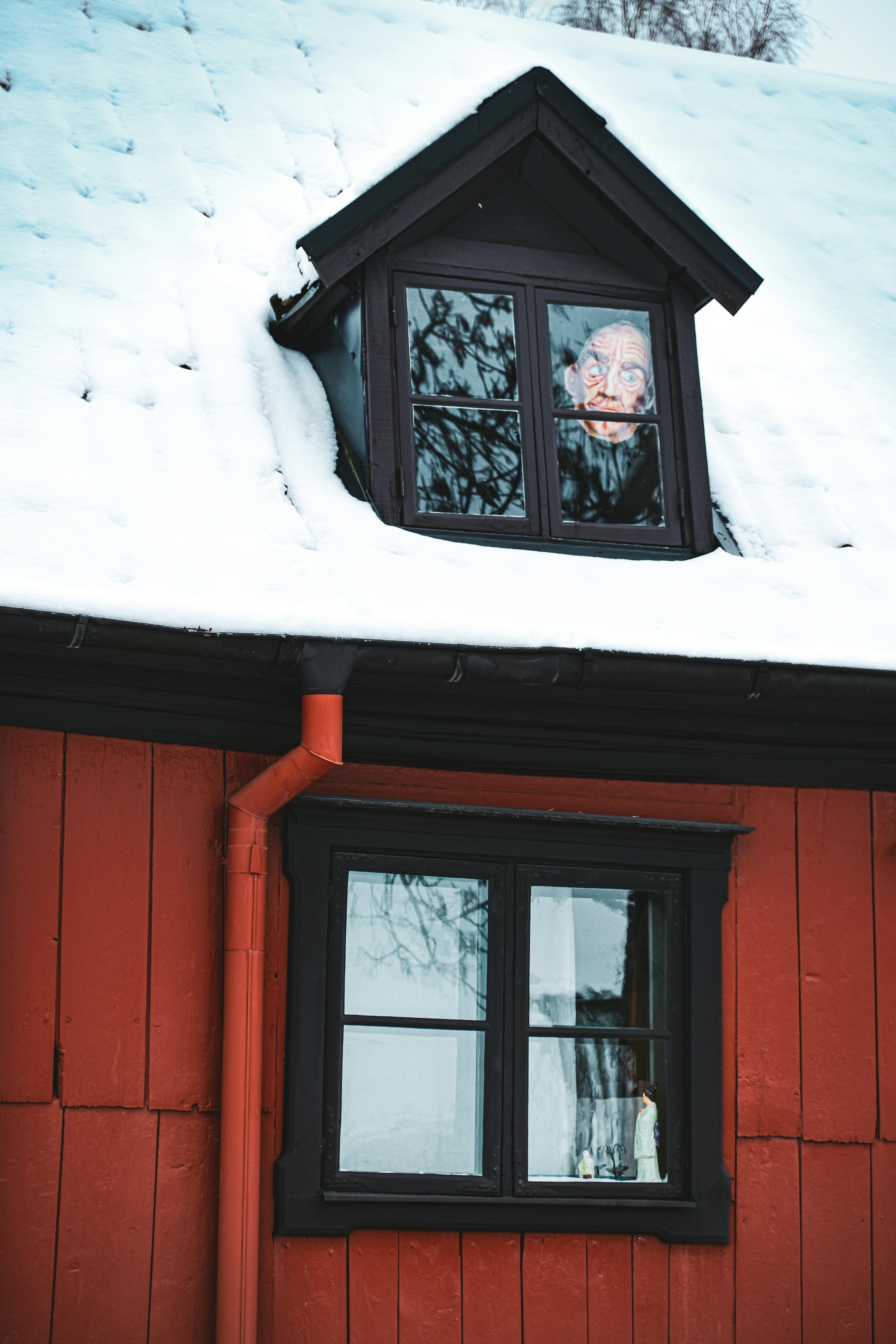Exterior of a Red House with Snow on the Roof · Free Stock Photo