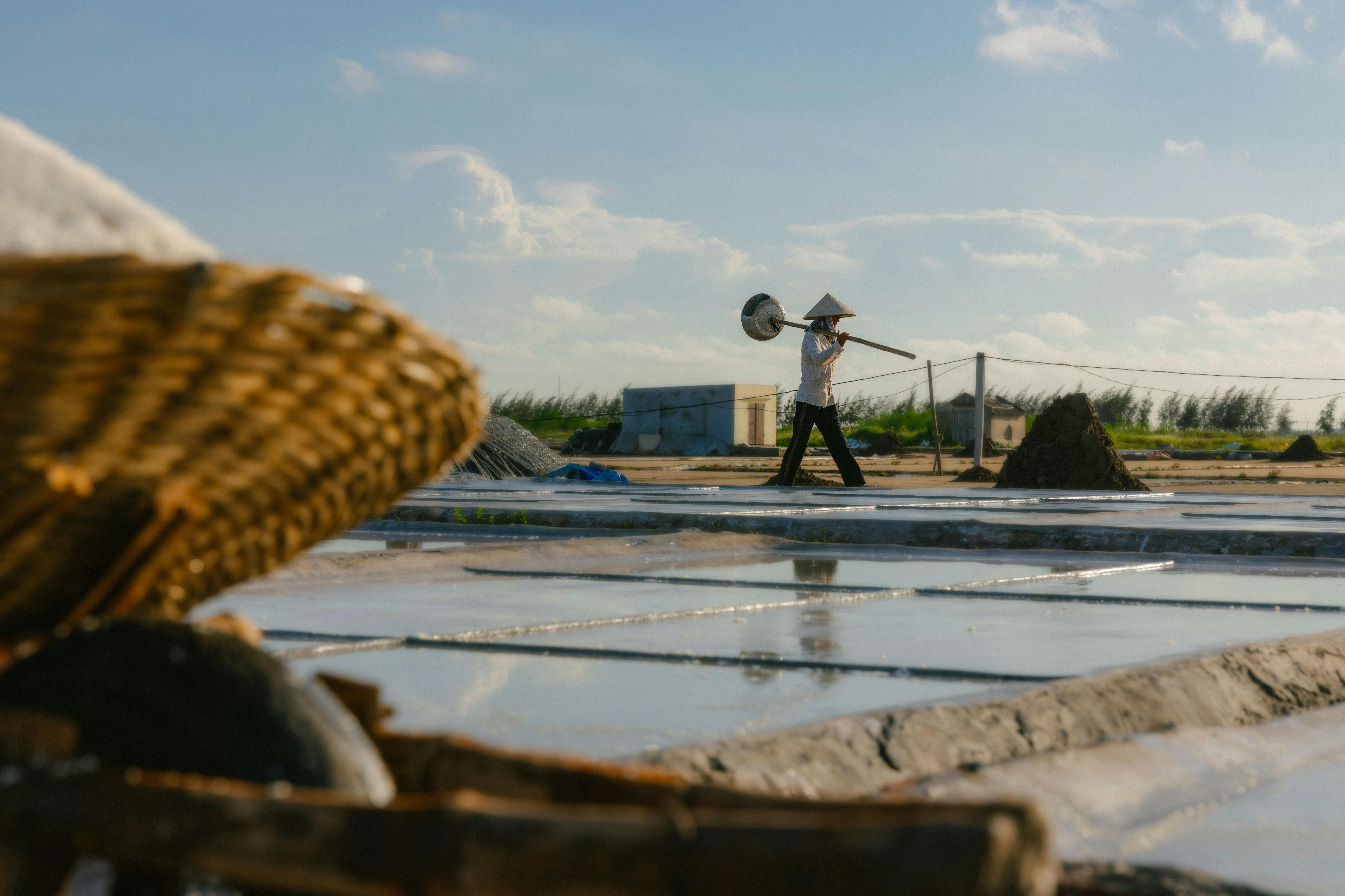 Traditional Salt Farmer in Rural Landscape · Free Stock Photo