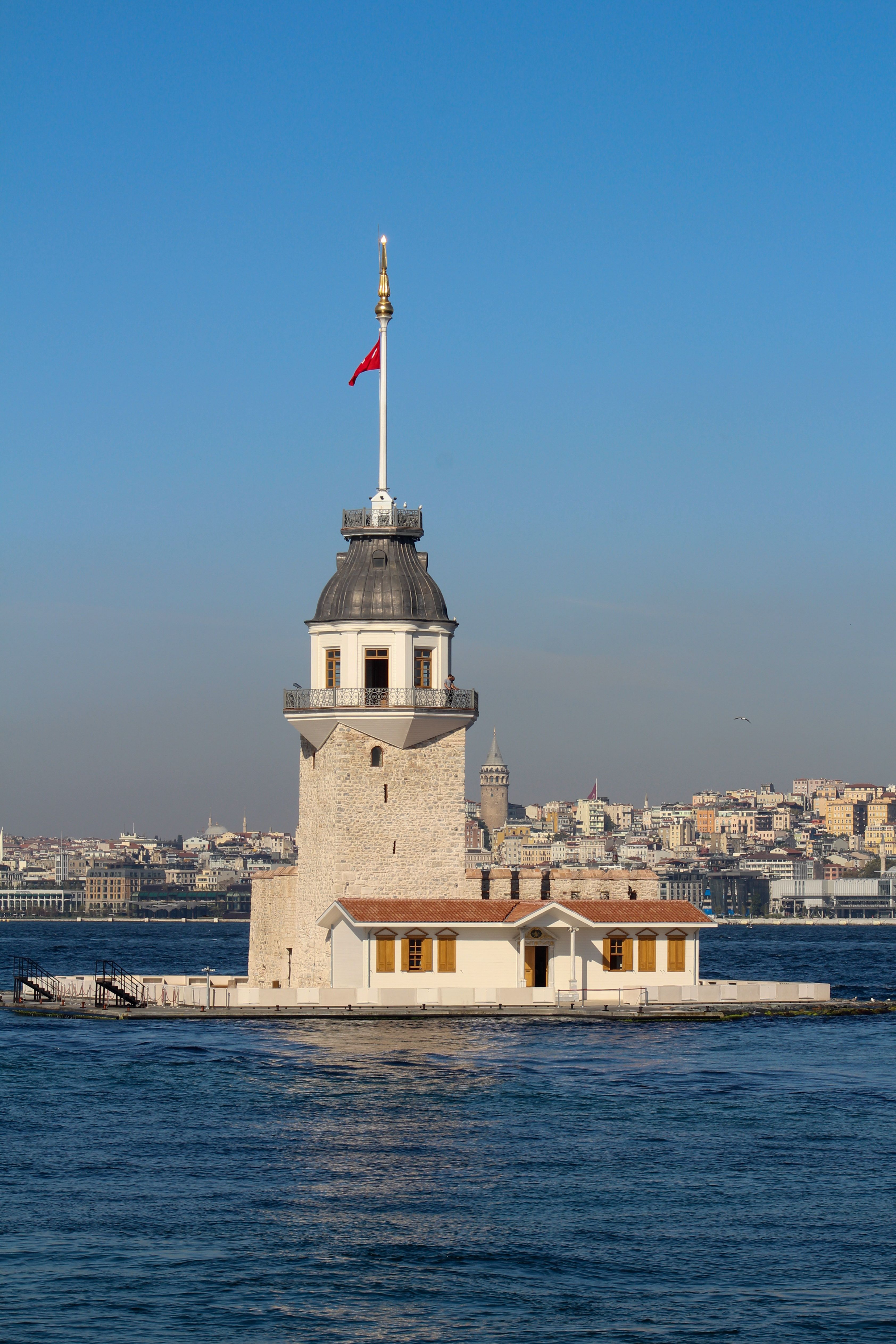 The tower is on a small island in the middle of the water · Free Stock ...