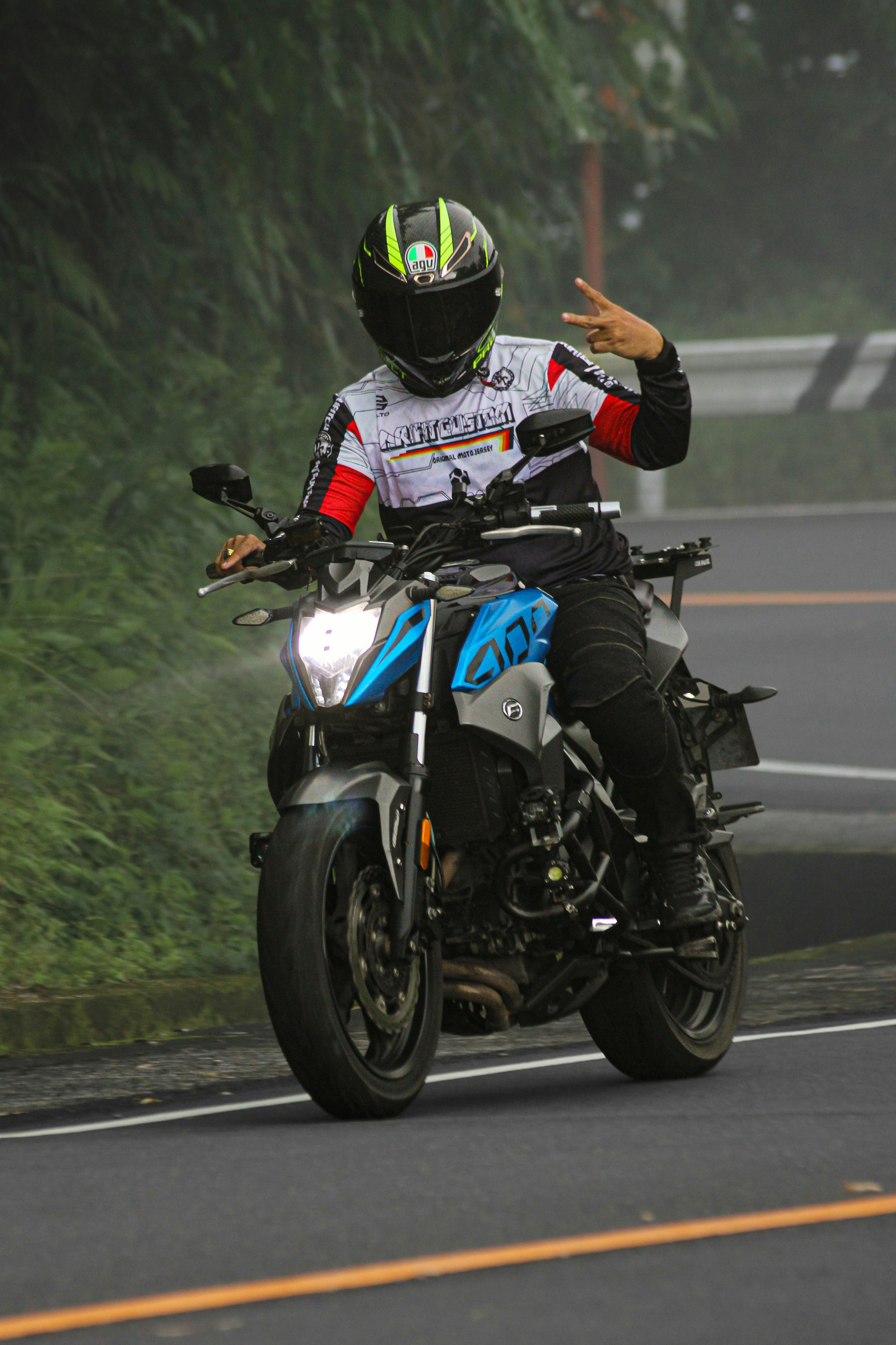 Man Riding on Motorcycle · Free Stock Photo