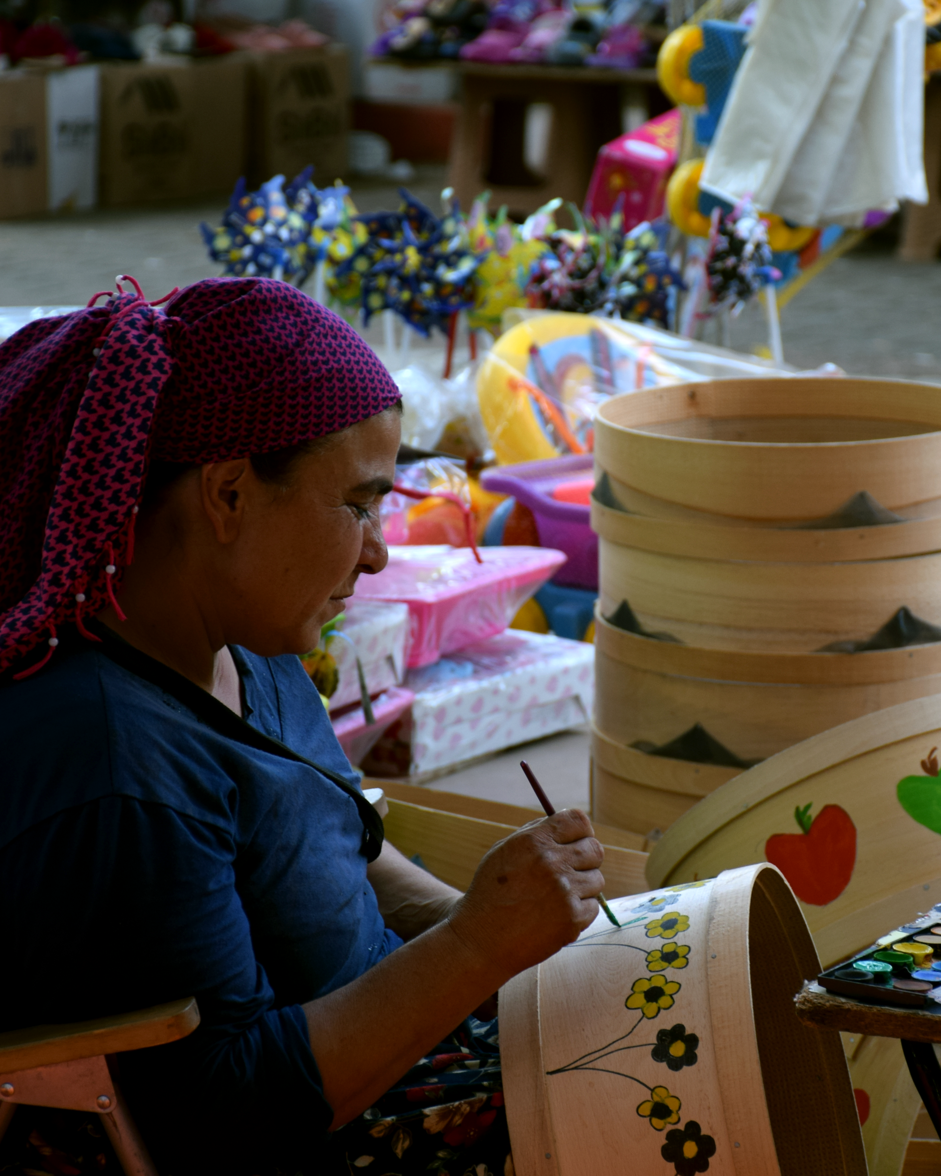 Woman Painting a Box · Free Stock Photo