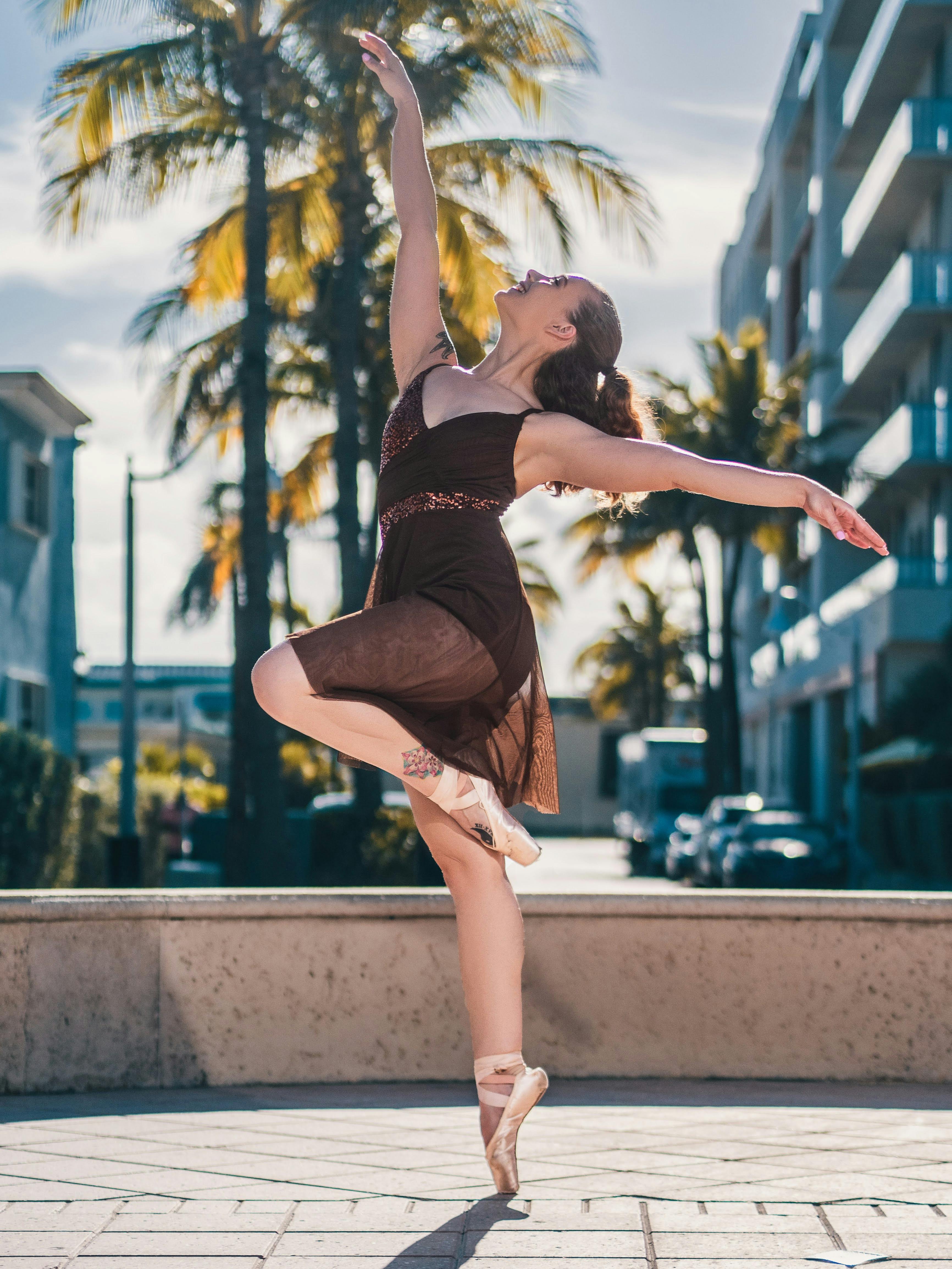 Ballerina in Dress Dancing in City · Free Stock Photo