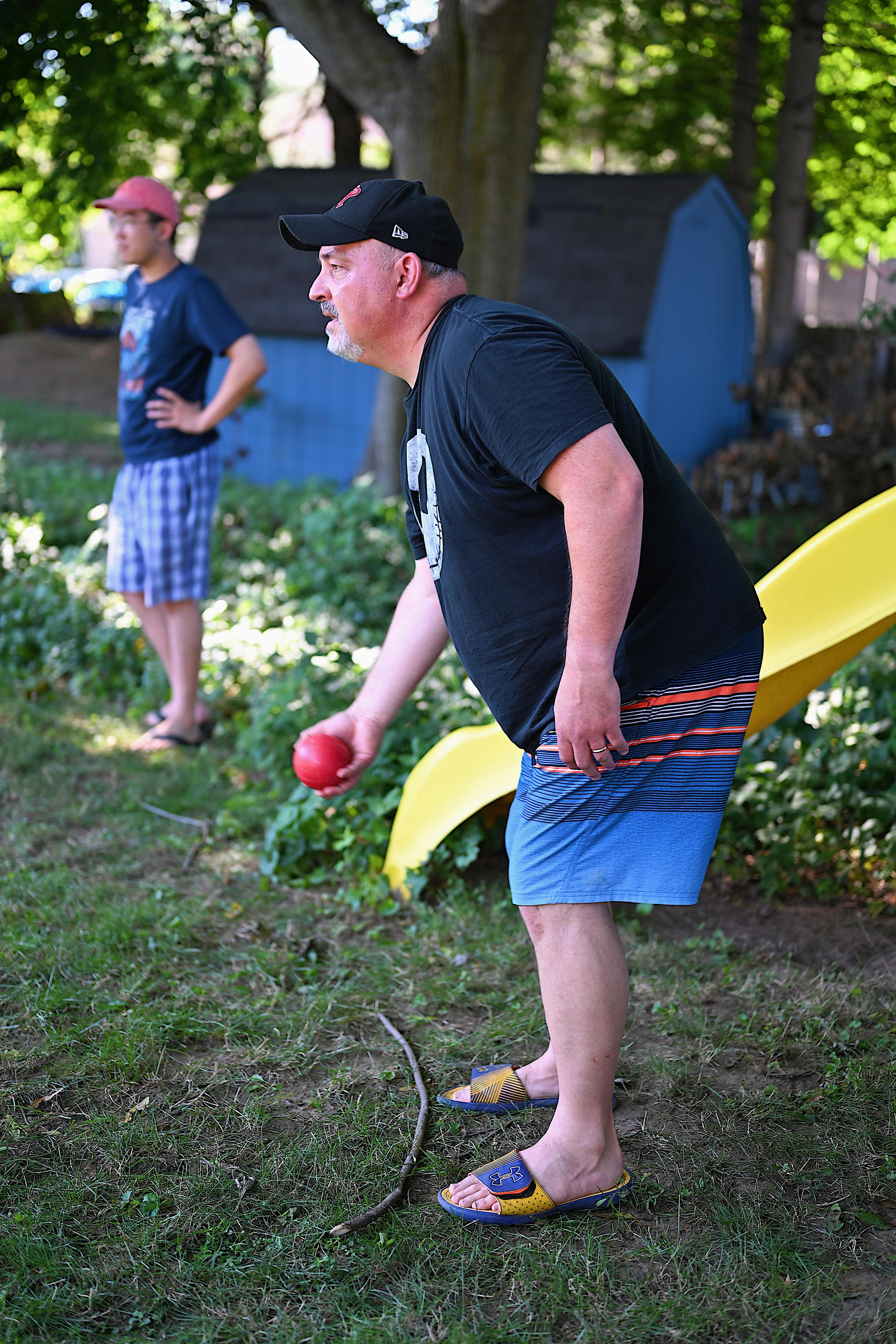 Men Playing in Yard · Free Stock Photo