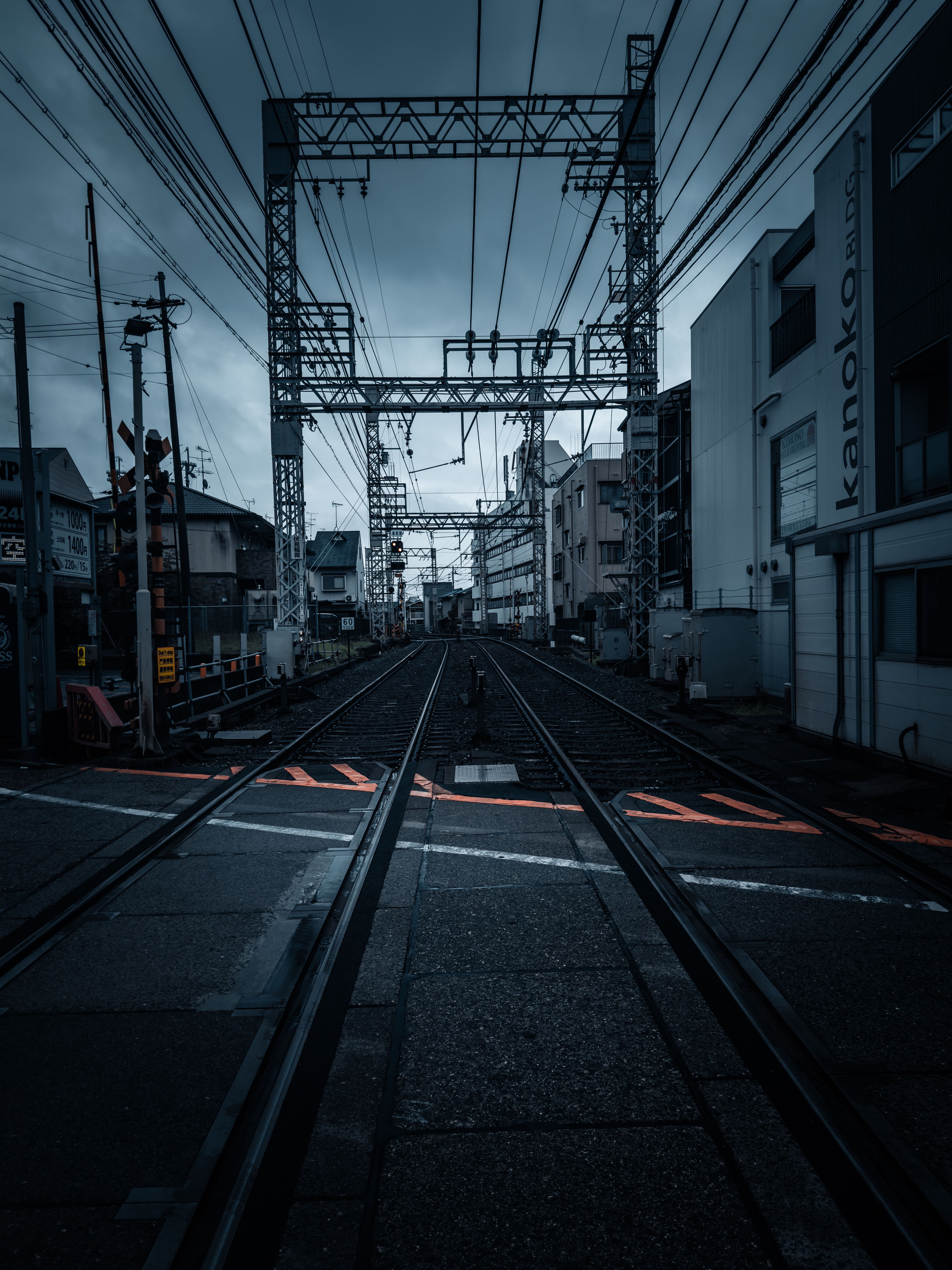 View of the Railway between Buildings in a City · Free Stock Photo